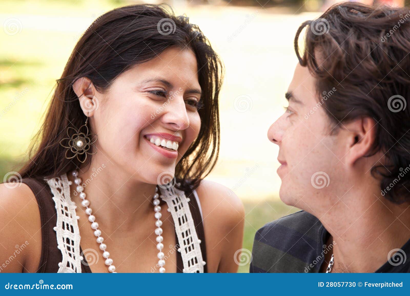 Loving Attractive Hispanic Couple at the Park Stock Photo - Image of ...