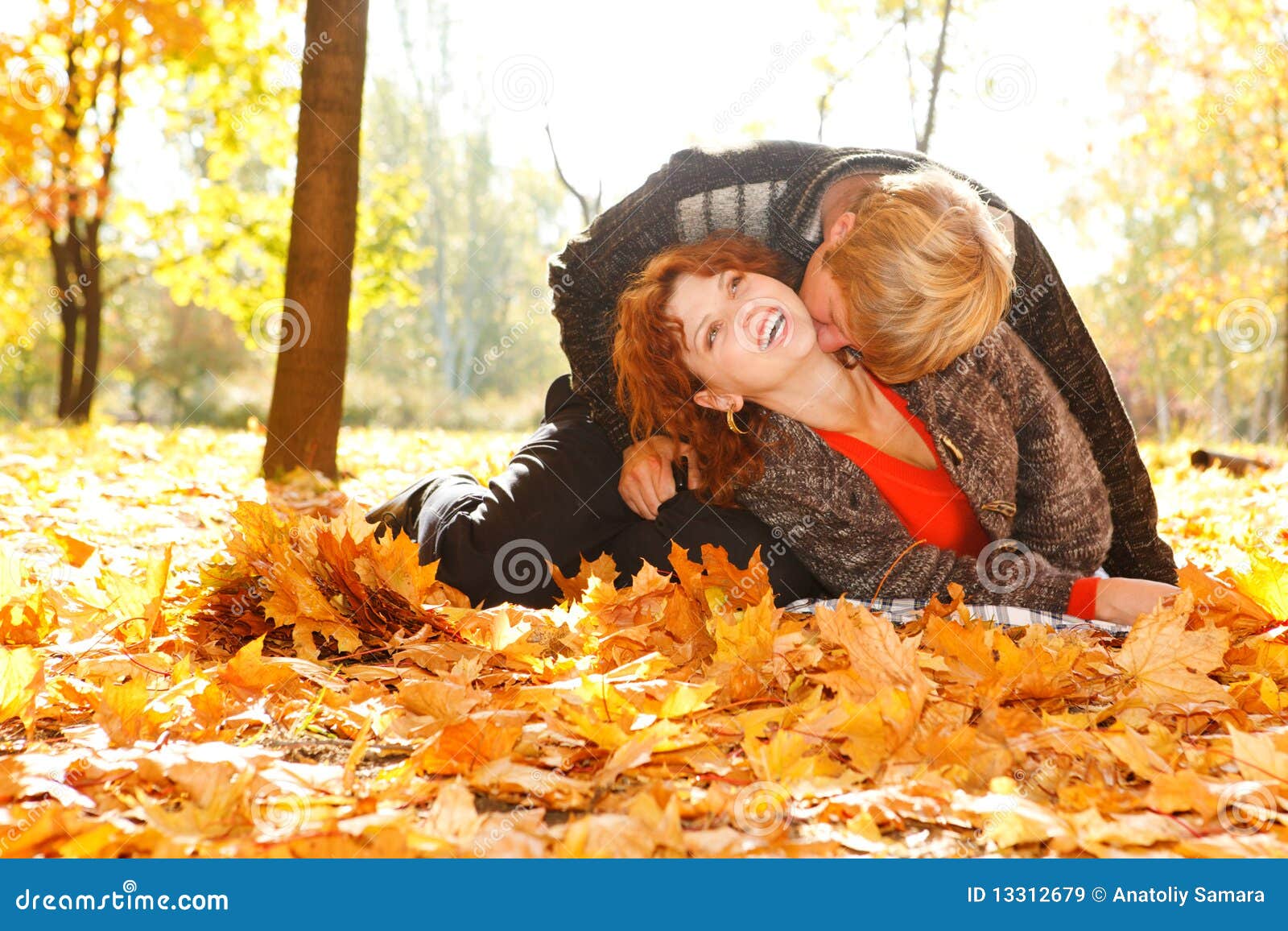 Loving autumn couple stock image. Image of orange, back - 13312679