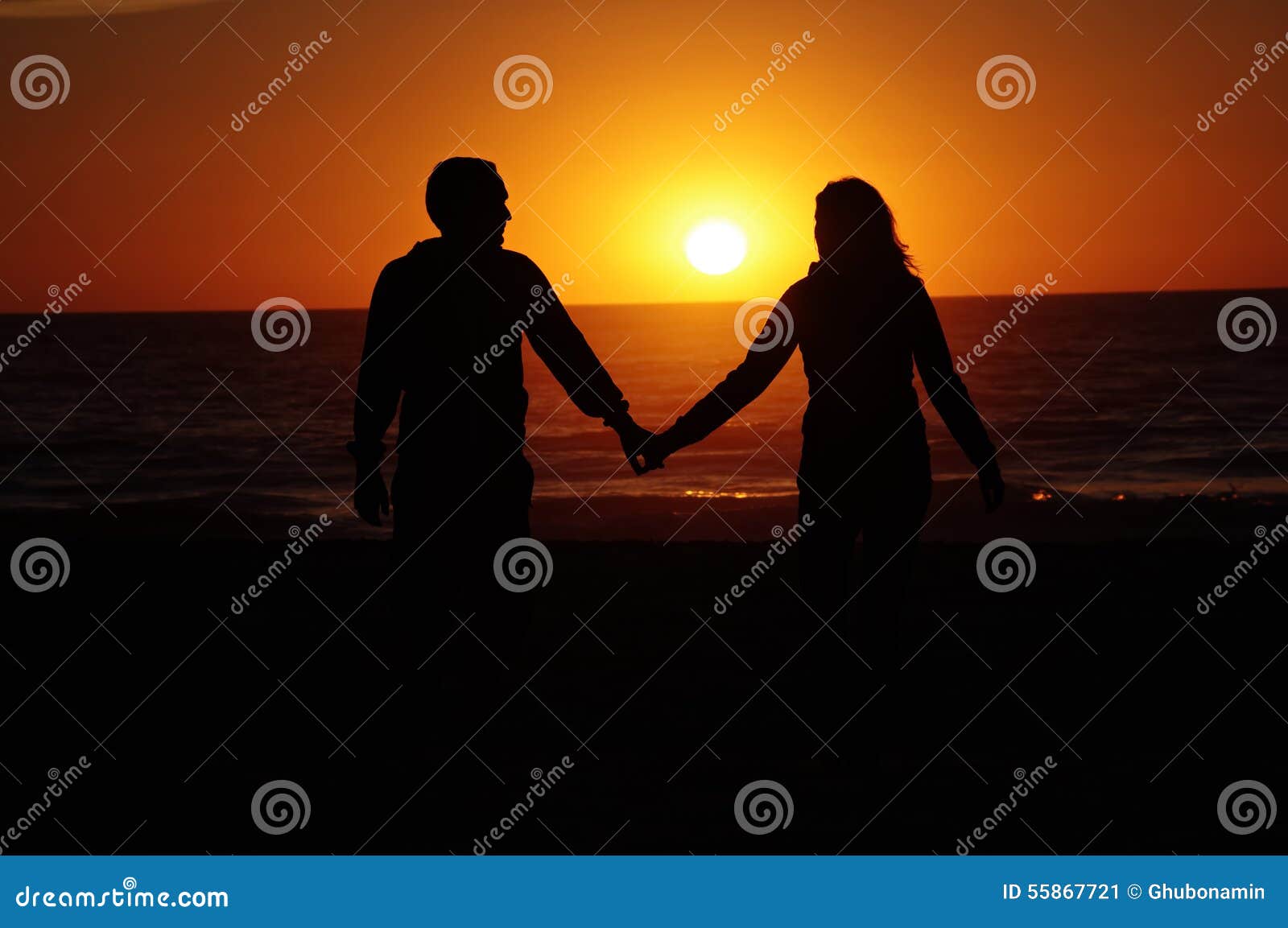 Loving couple beach sunset stock image. Image of orange - 55867721