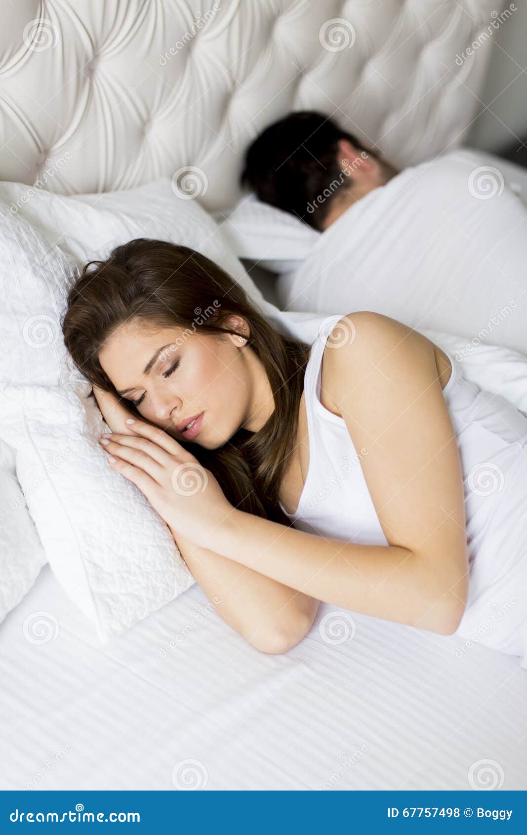 Loving couple in the bed stock photo. Image of relaxation - 67757498