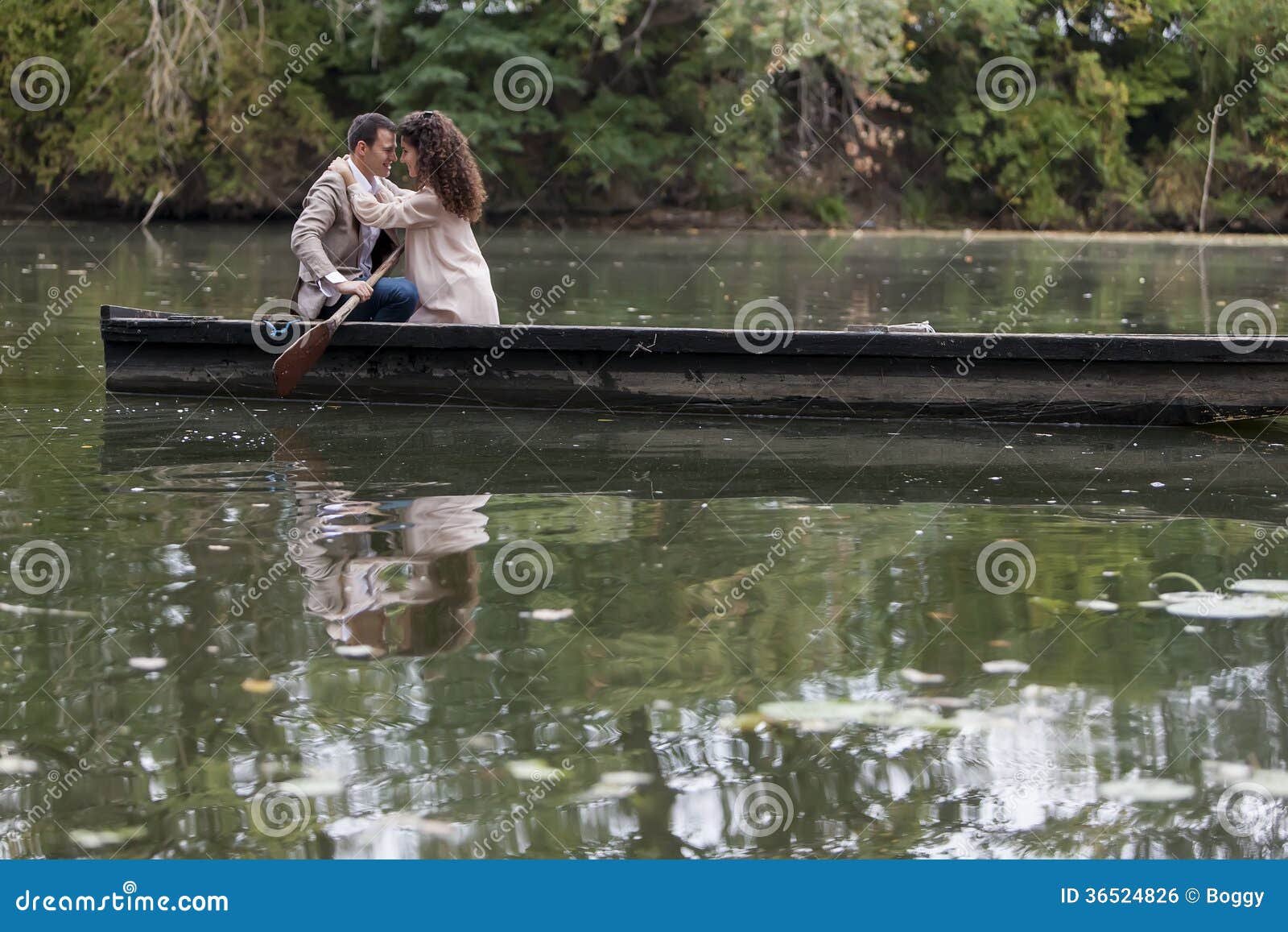 Loving couple in the boat stock photo. Image of adult - 36524826