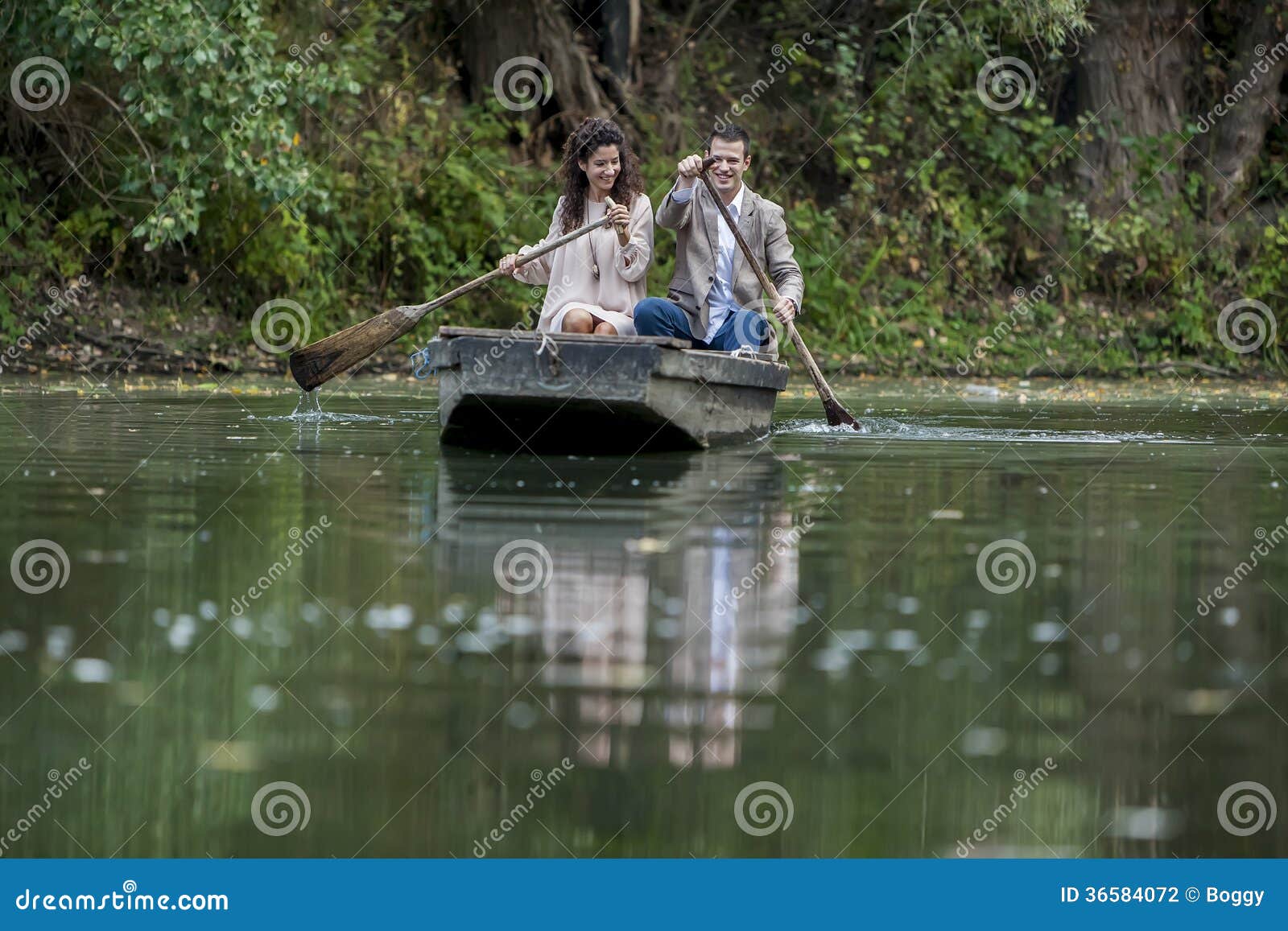Loving couple in the boat stock photo. Image of outdoor - 36584072