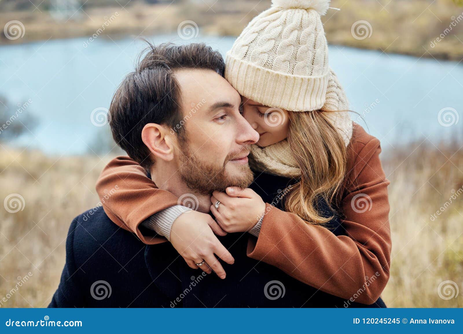 Loving Couple Embracing In The Field Autumn Landscape Man And Woman