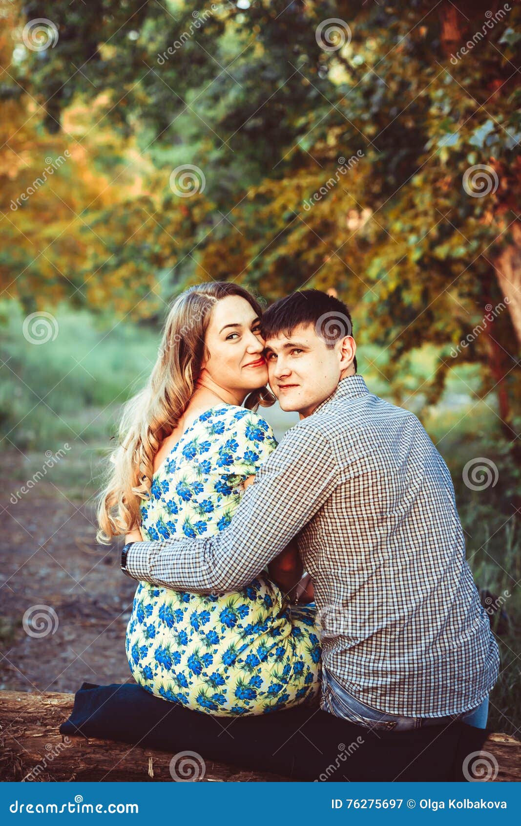Loving Couple Embracing Sitting In The Woods Stock Image Image Of