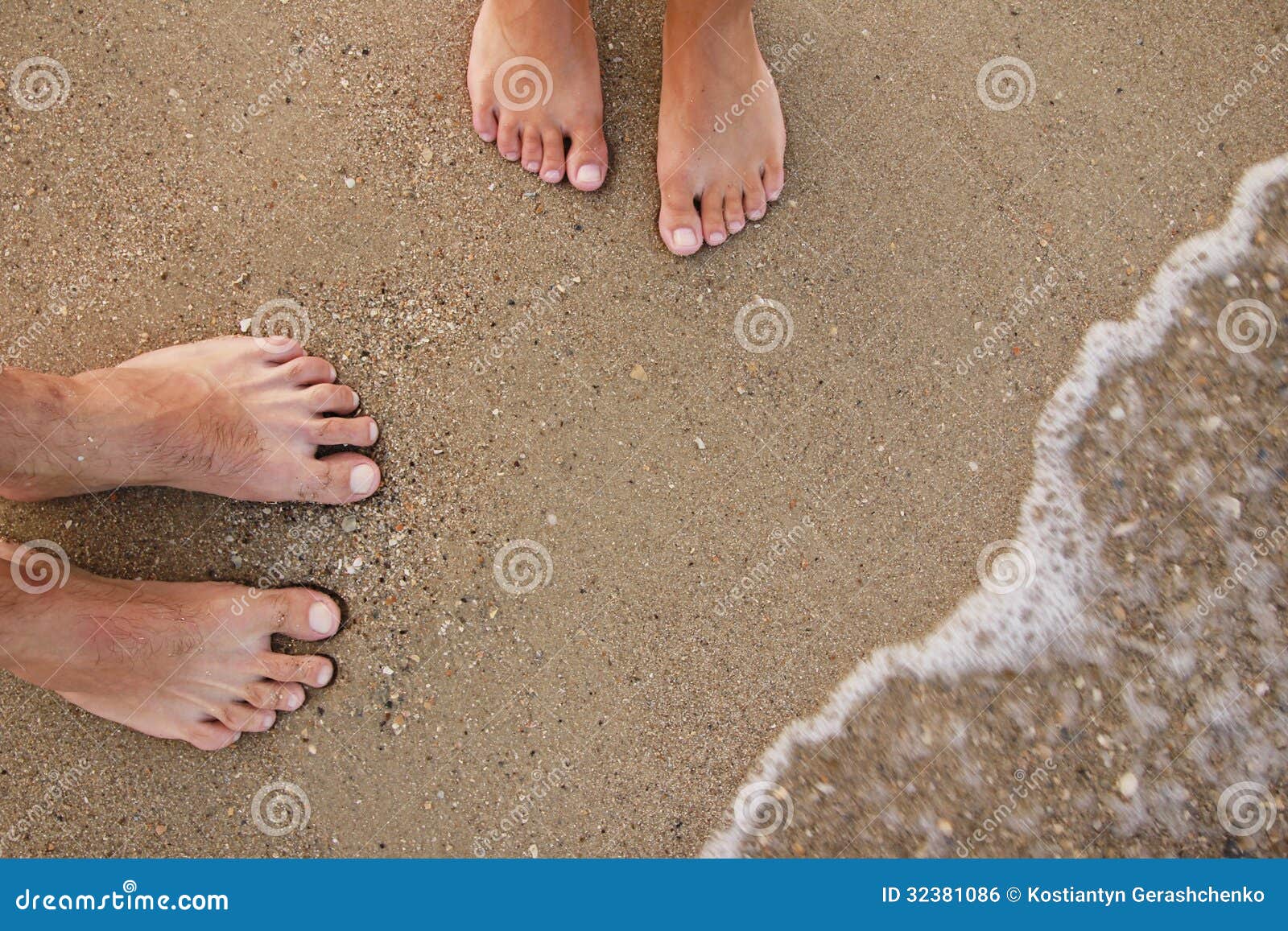 Loving Couple Feet in the Sand Stock Photo - Image of track ...