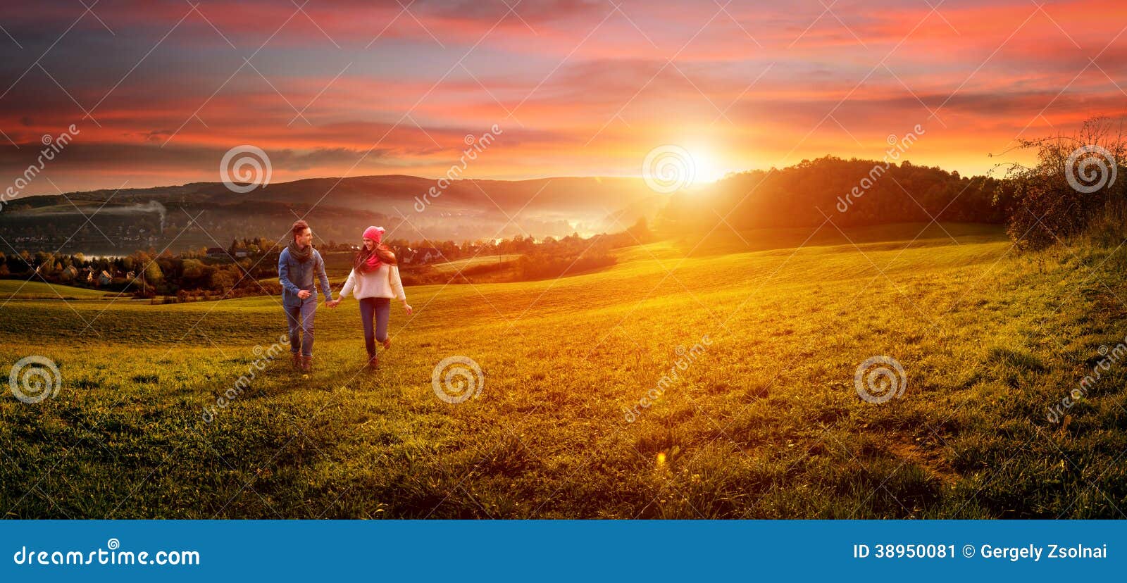 Loving Couple Holding Hands Running on the Field. Stock Image - Image ...