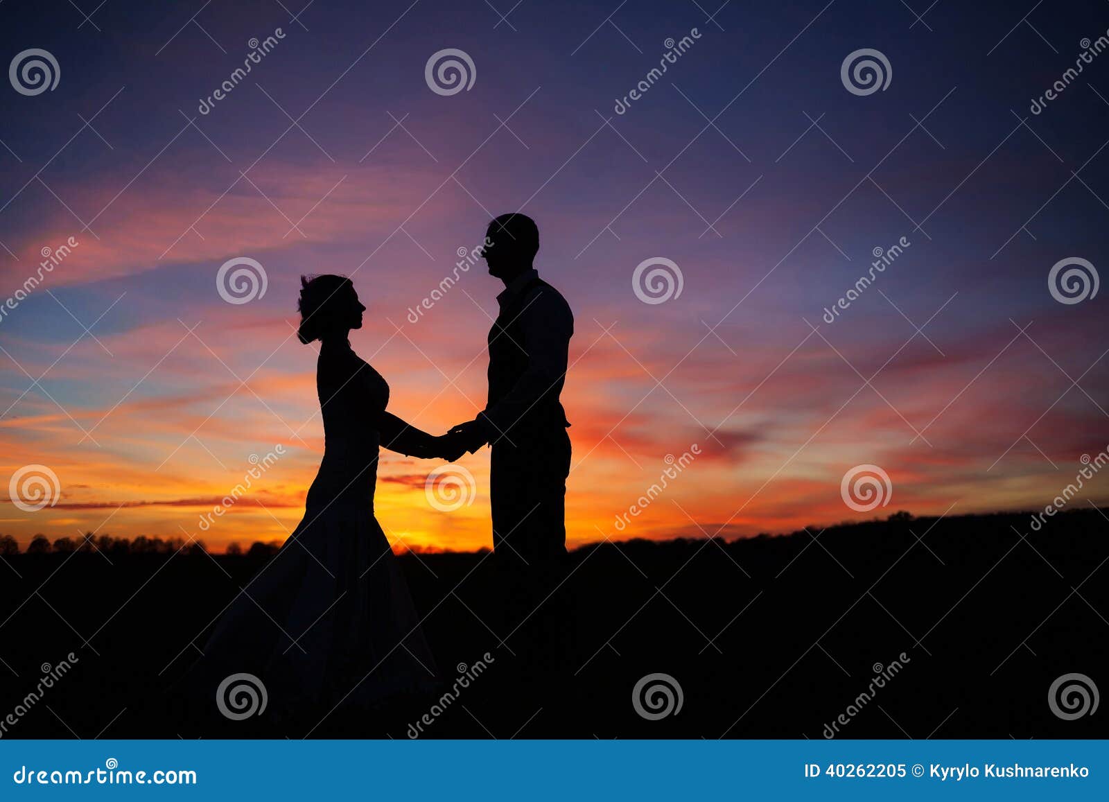 Loving Couple Holding Hands at Sunset Stock Image - Image of ...