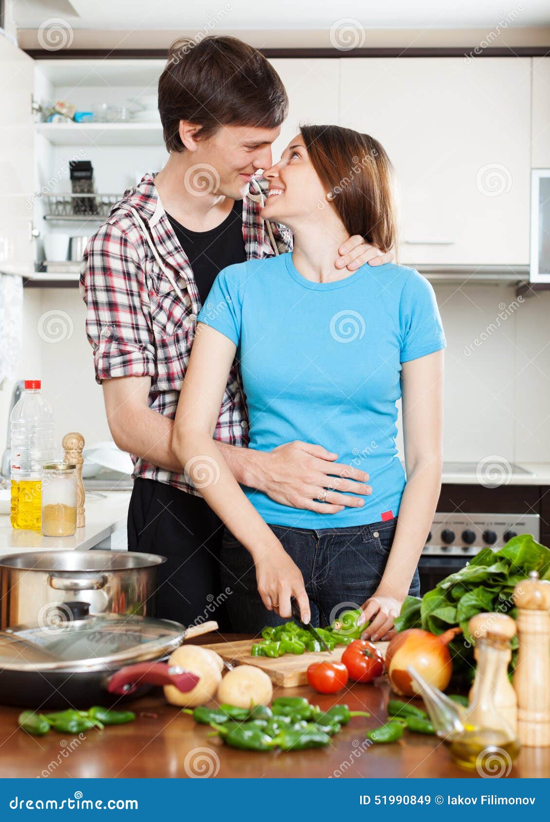 Loving Couple Hugging in Kitchen Stock Image - Image of housewife, male ...