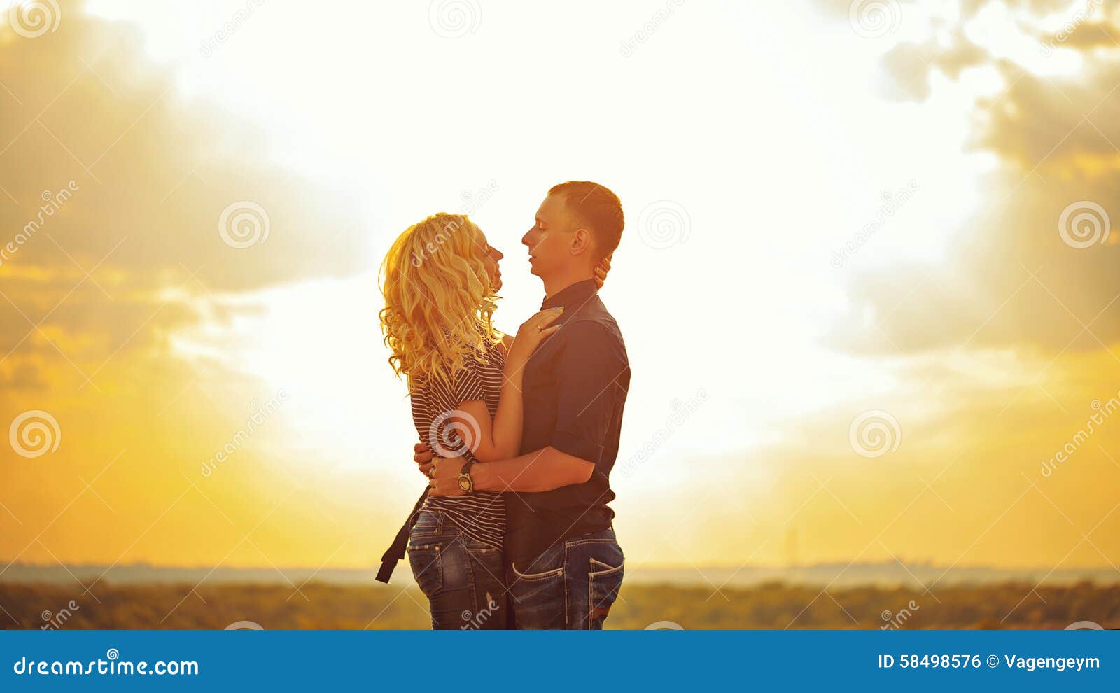 Loving Couple Hugging at Sunset. Stock Photo - Image of relaxation ...