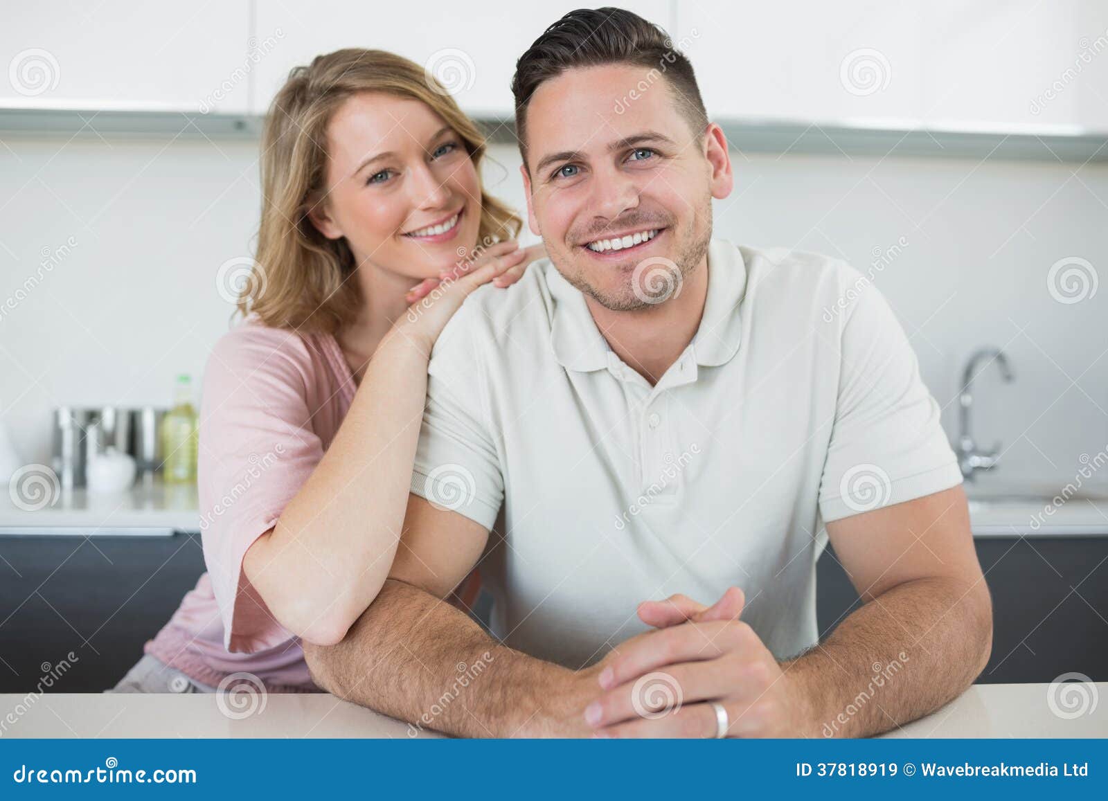 Loving Couple at Kitchen Counter Stock Image - Image of woman ...
