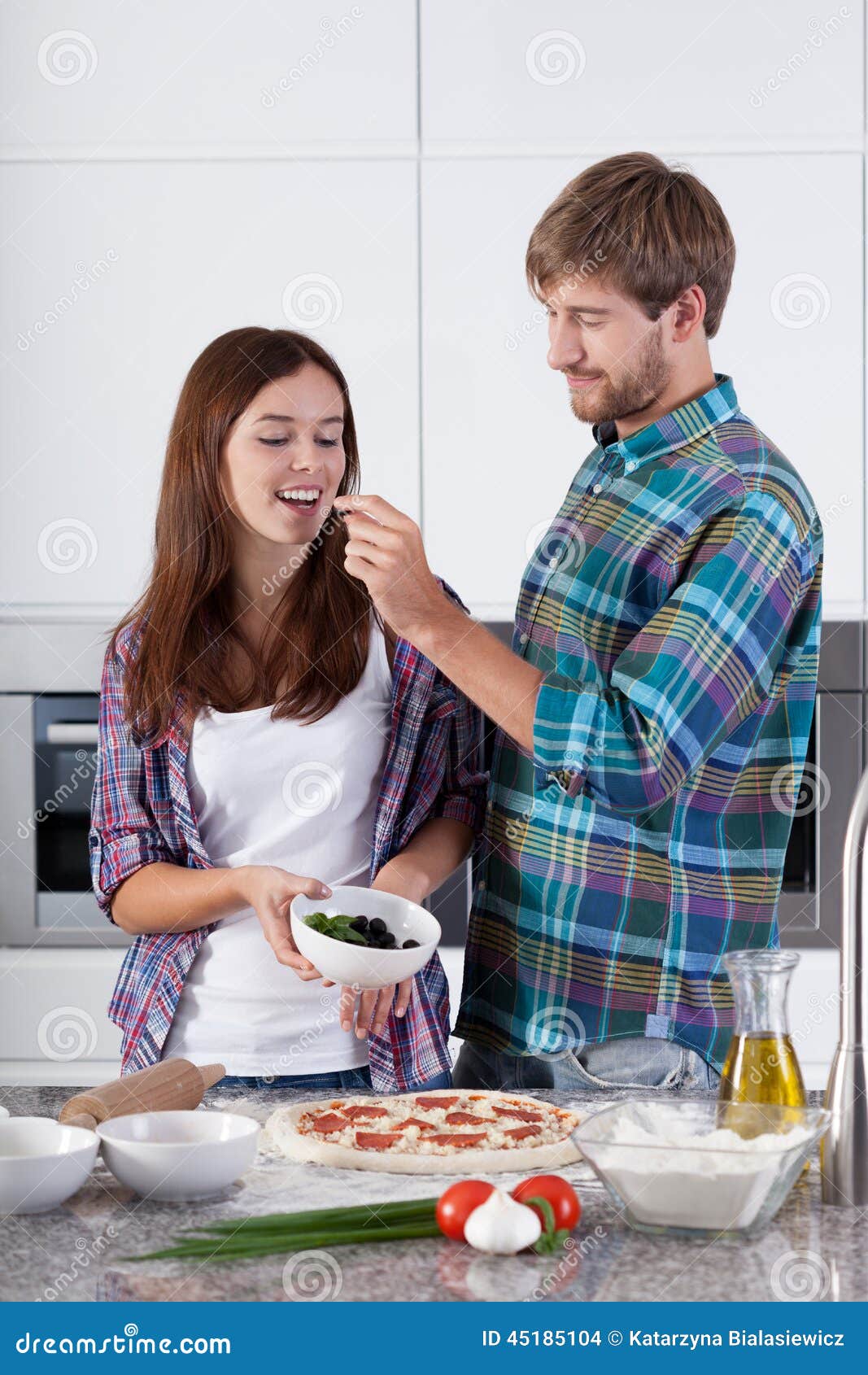 Loving couple made a pizza stock photo. Image of pleasure - 45185104