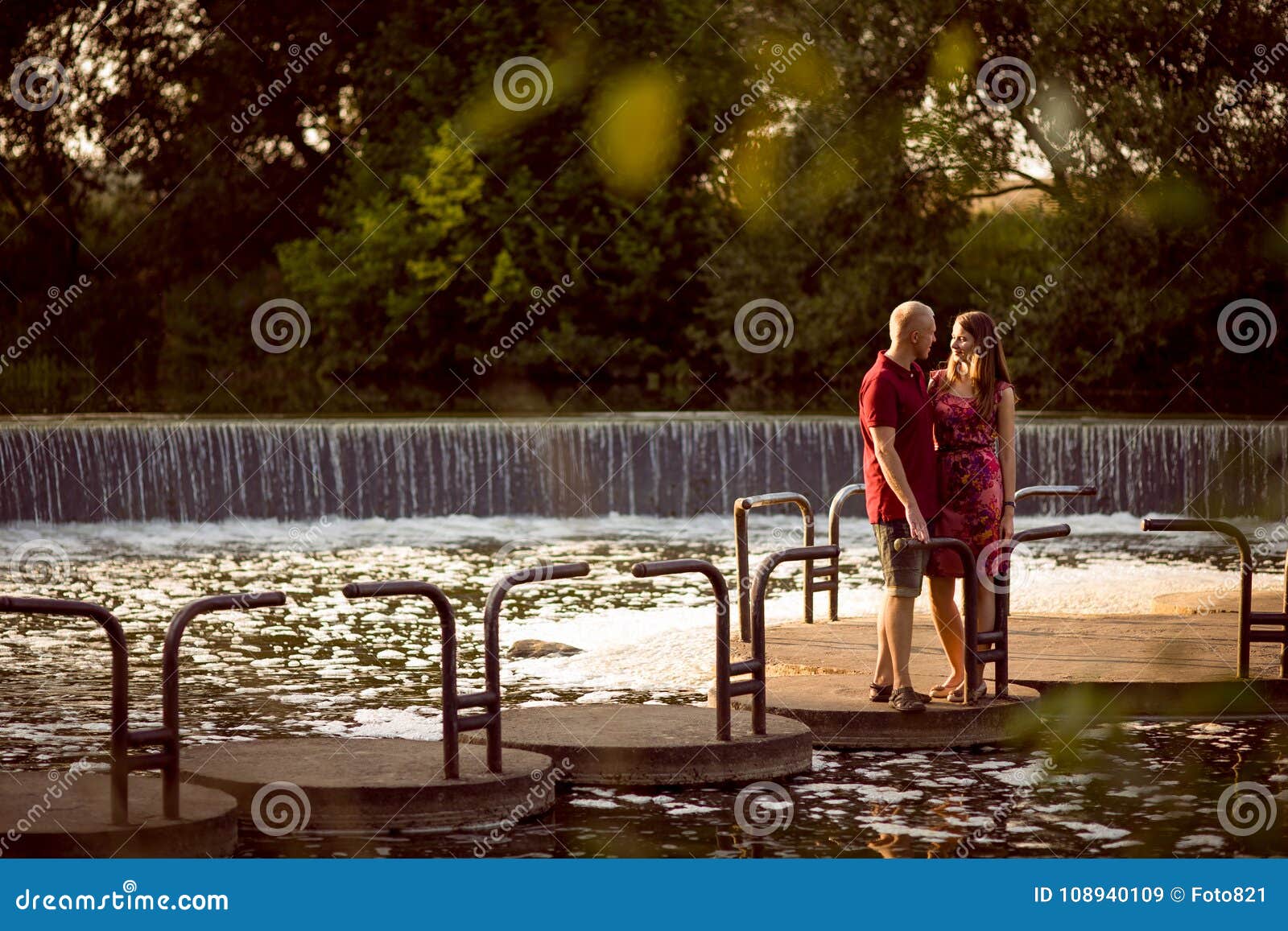 Loving couple in the park stock image. Image of green - 108940109
