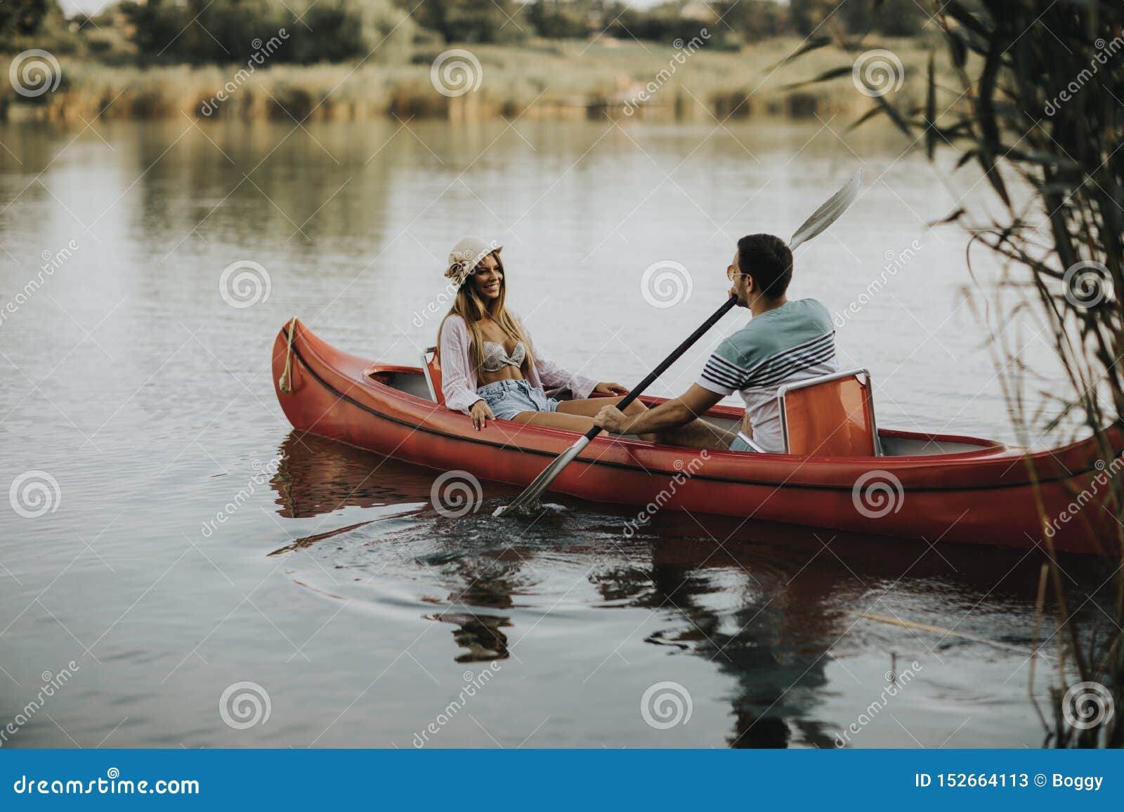 Loving Couple Rowing on the Lake Stock Image - Image of recreational ...