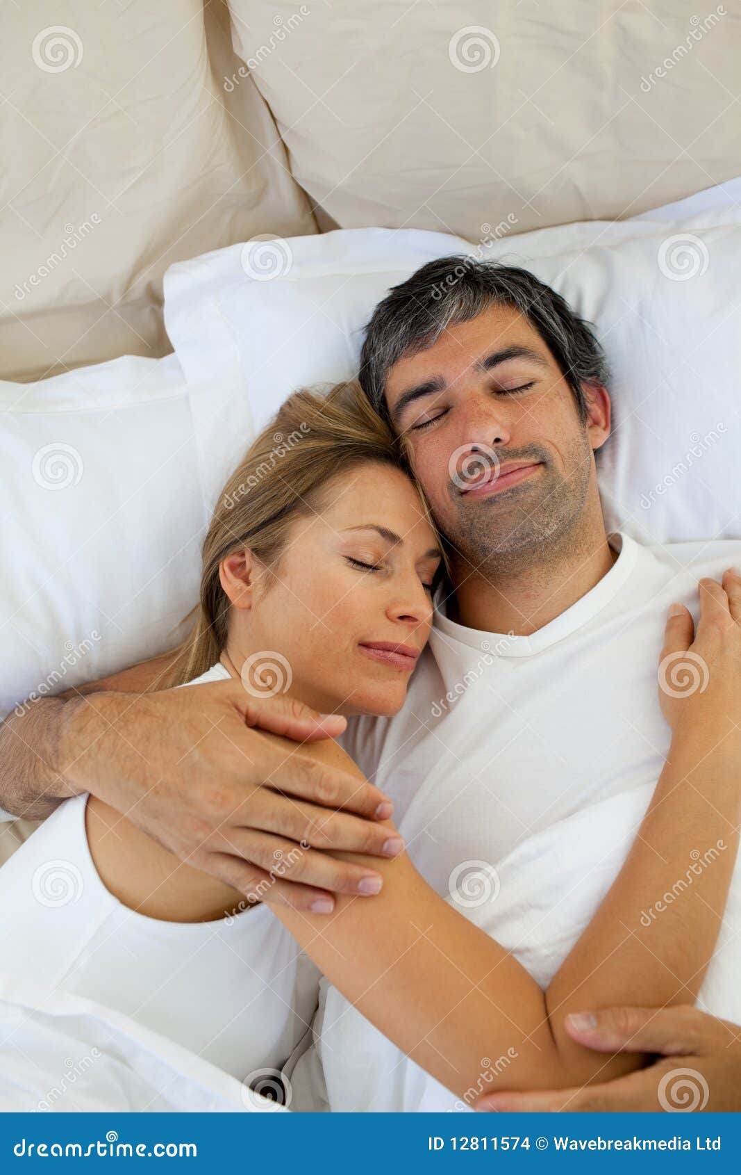 Loving couple sleeping stock photo. Image of pillow, people - 12811574