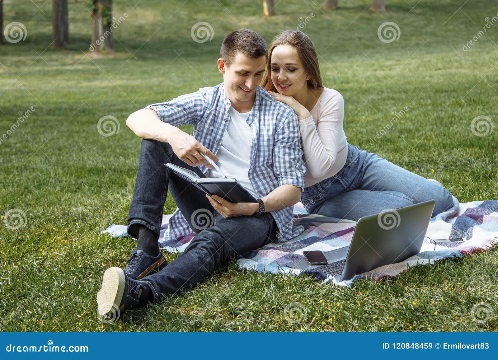 Loving Couple Students Doing Homework in the Park. Stock Image - Image ...