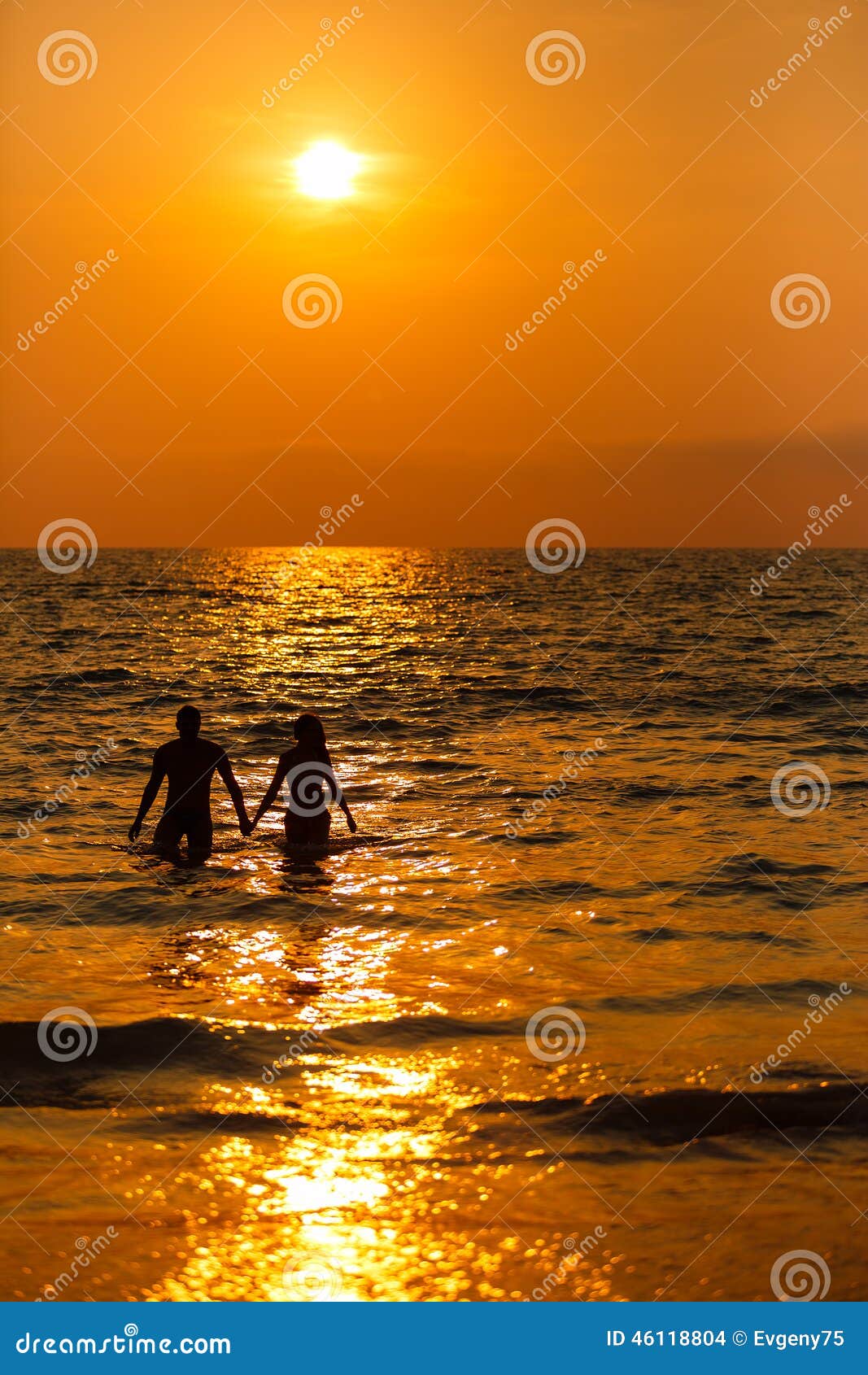 Loving Couple at Sunset in the Sea Stock Photo - Image of light, people ...