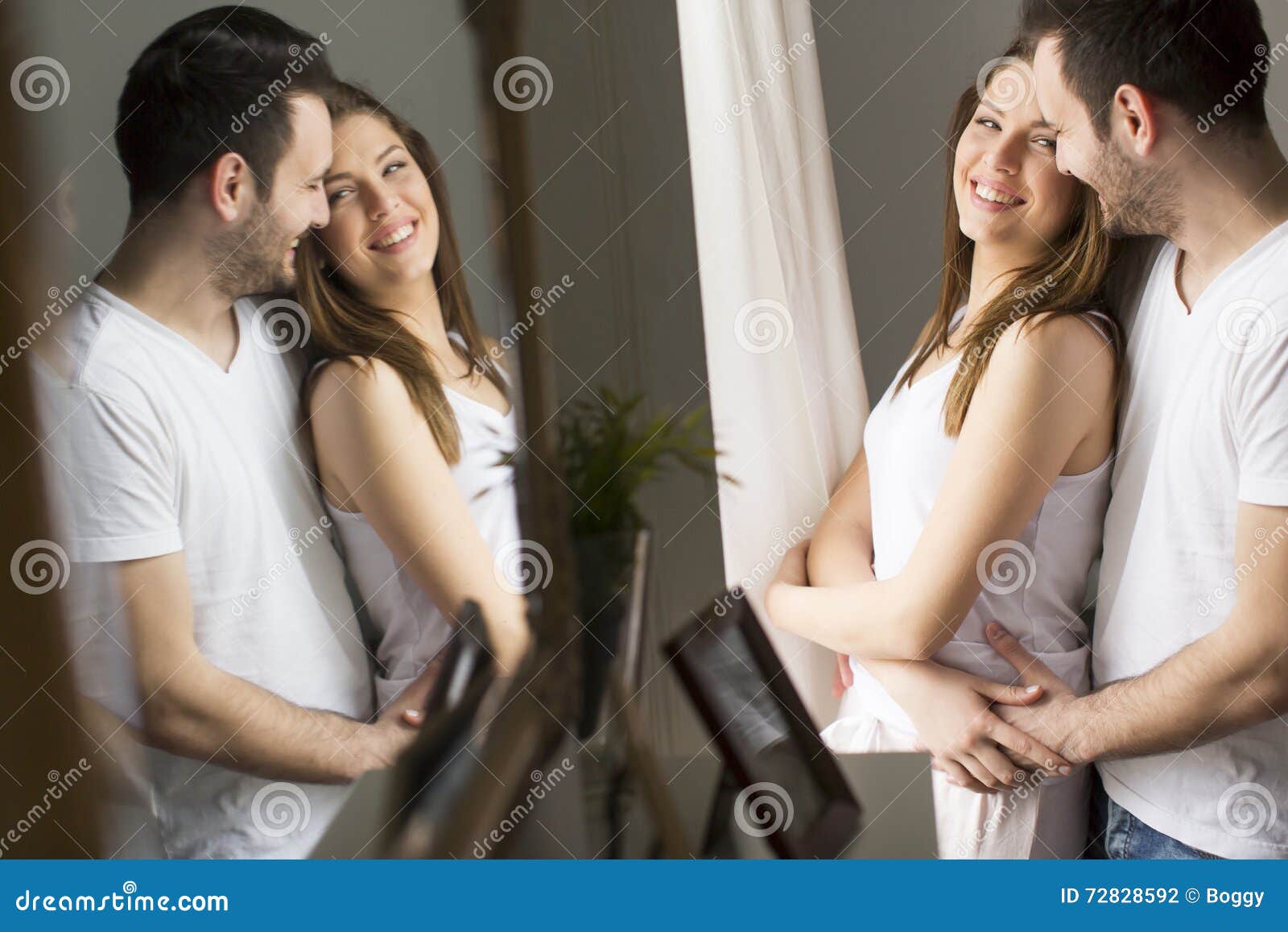 Loving Couple by the Window Stock Photo - Image of people, wife: 72828592