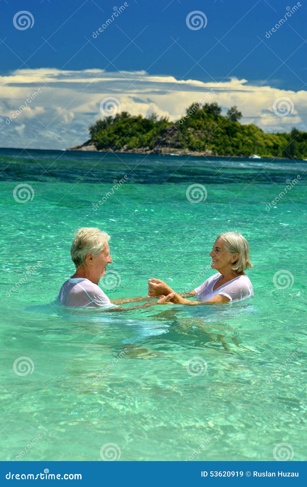 Loving Elderly Couple Bathing in the Sea Stock Image - Image of ...