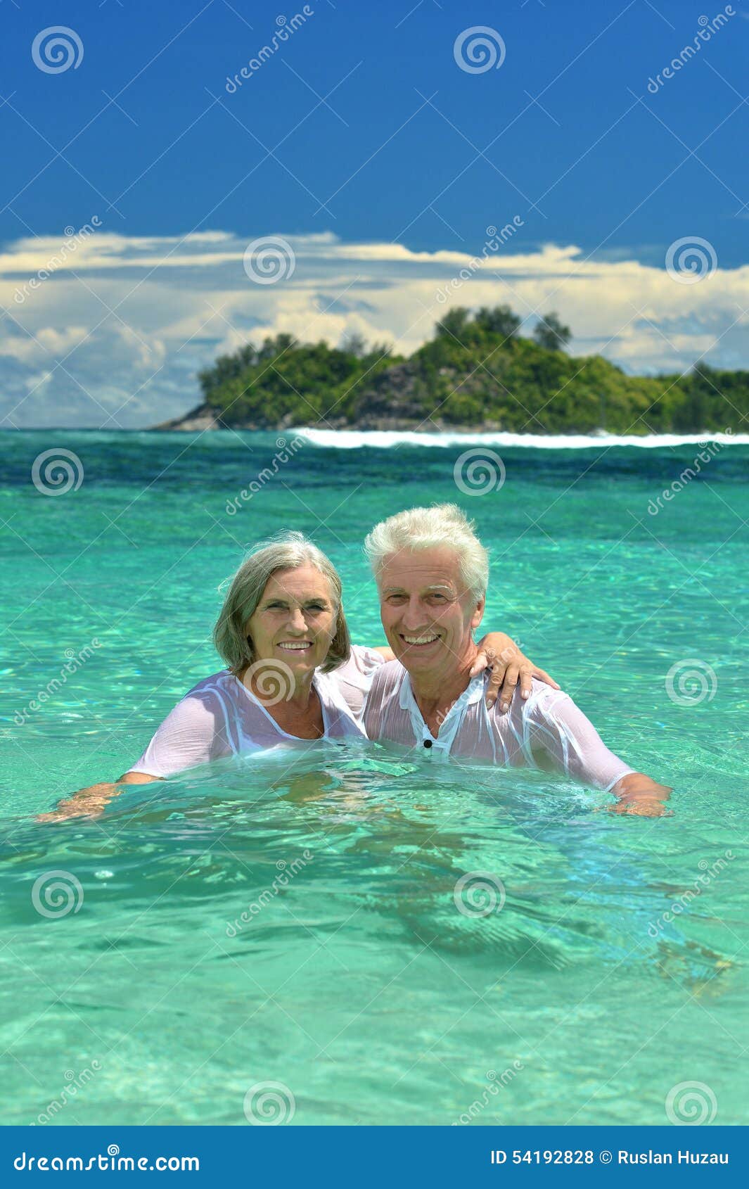 Loving Elderly Couple Bathing in the Sea Stock Photo - Image of ...