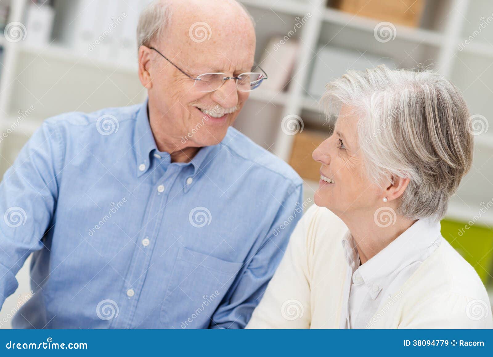 Loving Elderly Couple Smiling at Each Other Stock Image - Image of ...
