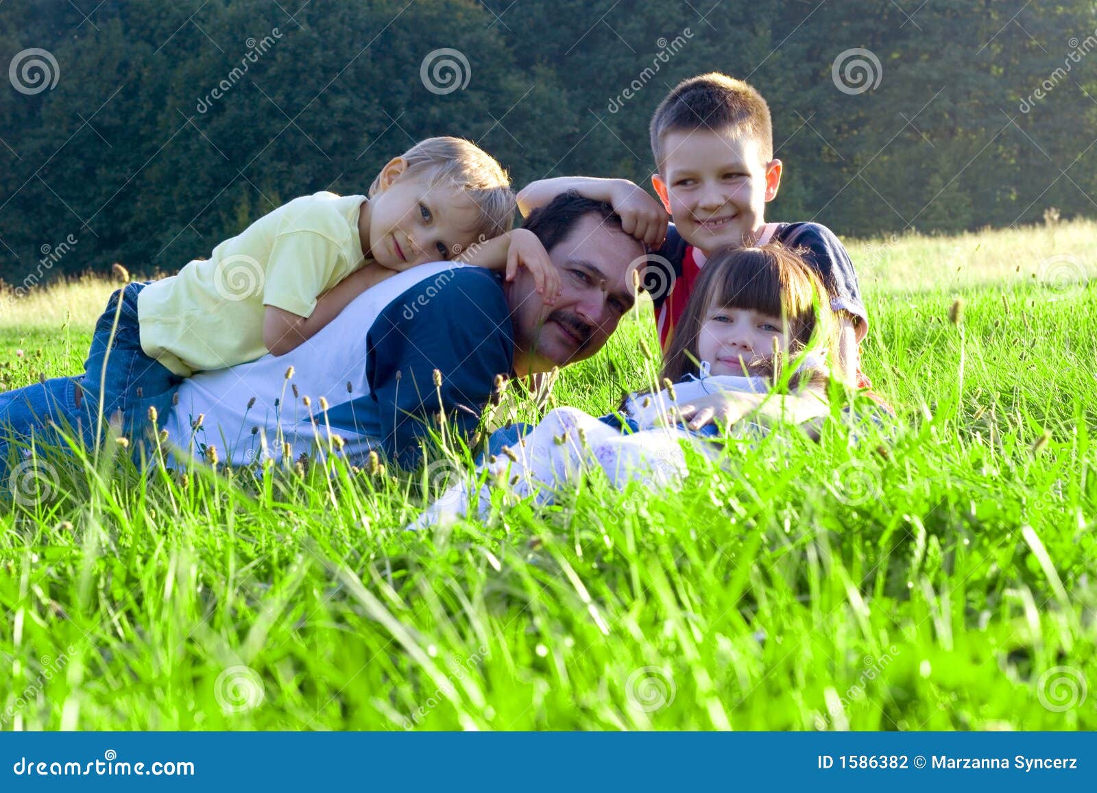 Loving Family stock photo. Image of devotion, parenting - 1586382