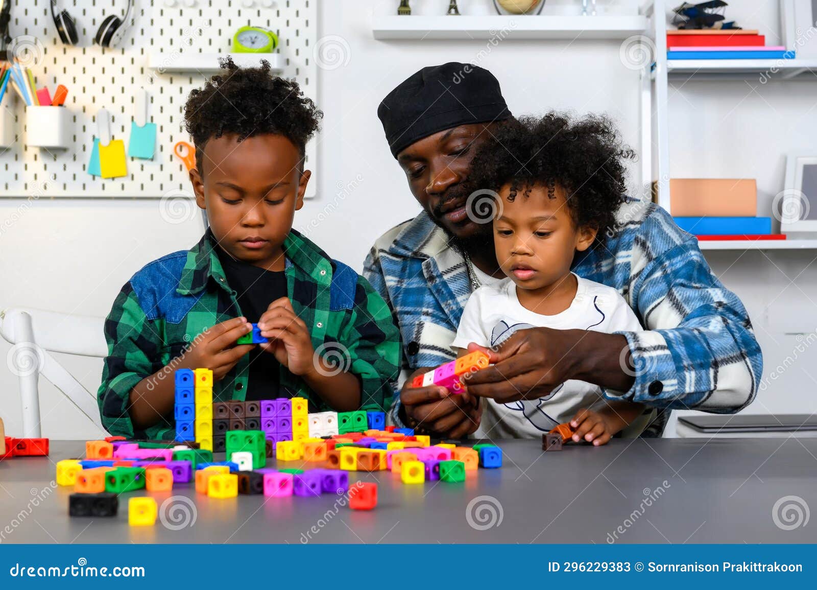 Loving Father Teaches and Plays with Son at Home for Learning and ...