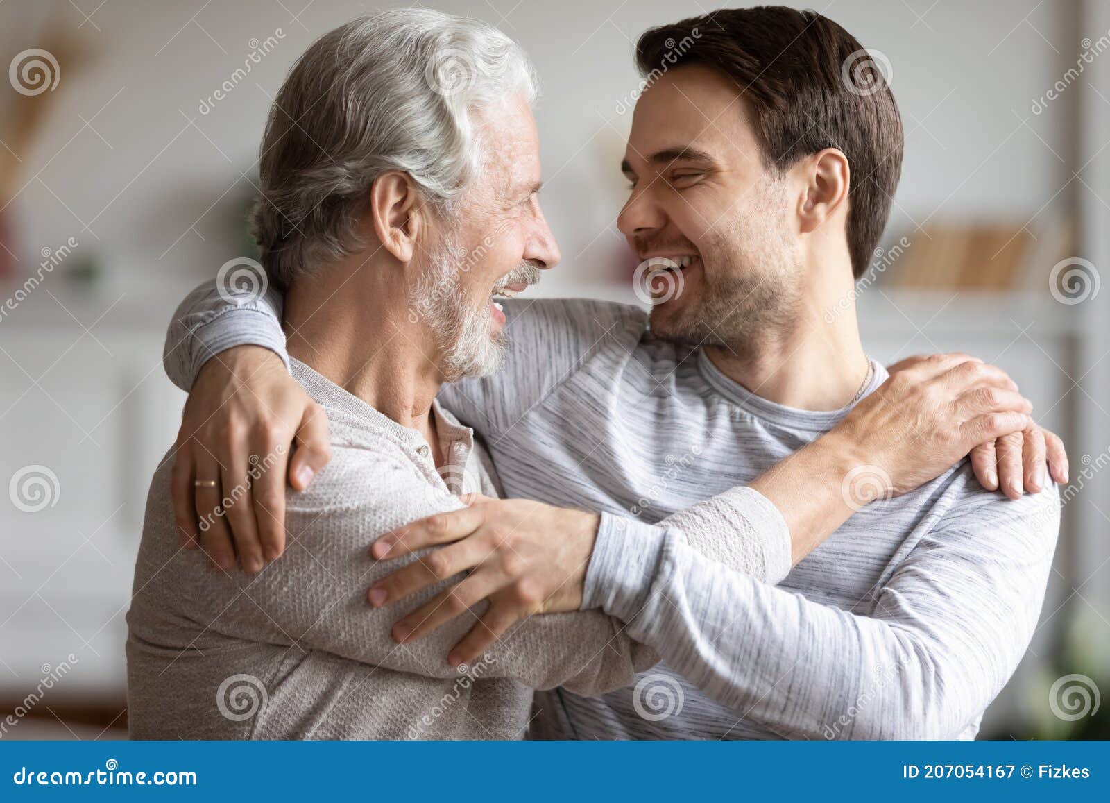 Loving Happy Mature Father And Adult Son Hug Stock Image Image Of
