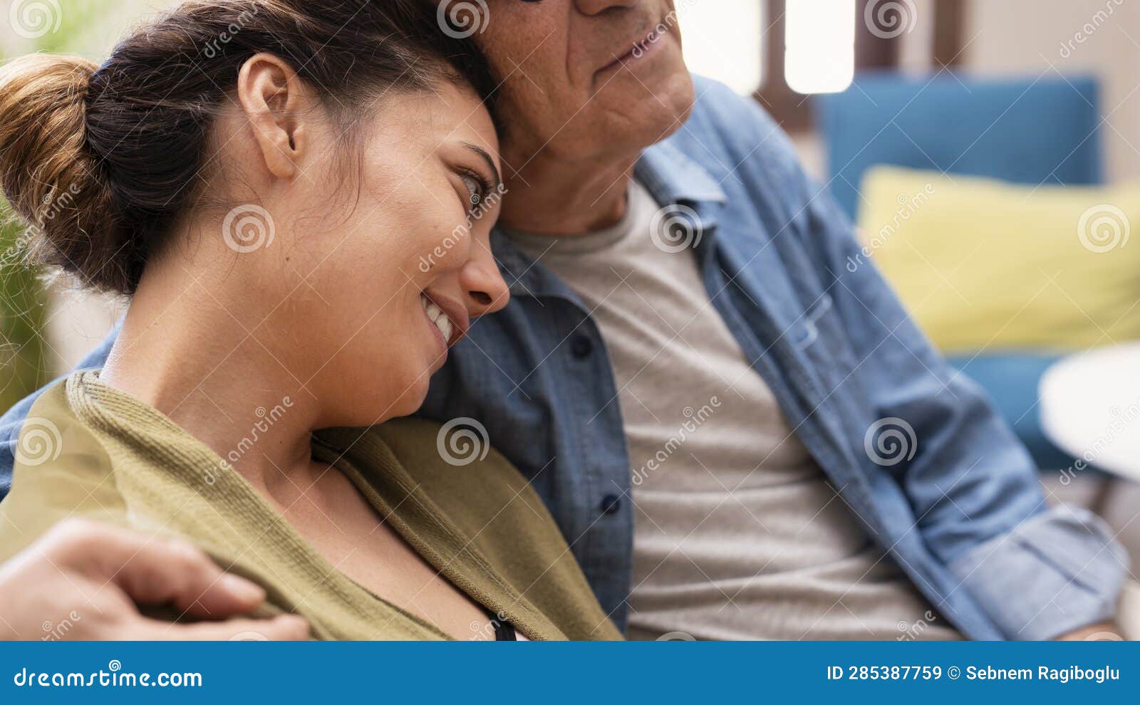 A loving hug at home stock image. Image of hands, person - 285387759