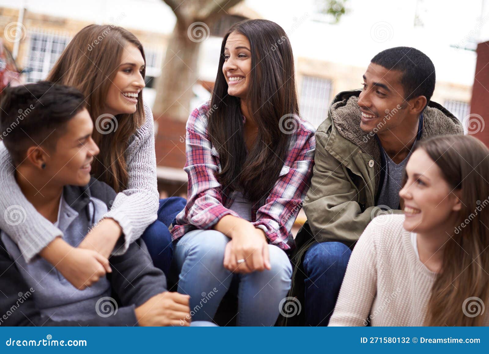 Loving Life on Campus. a Group of University Students Talking on Campus ...