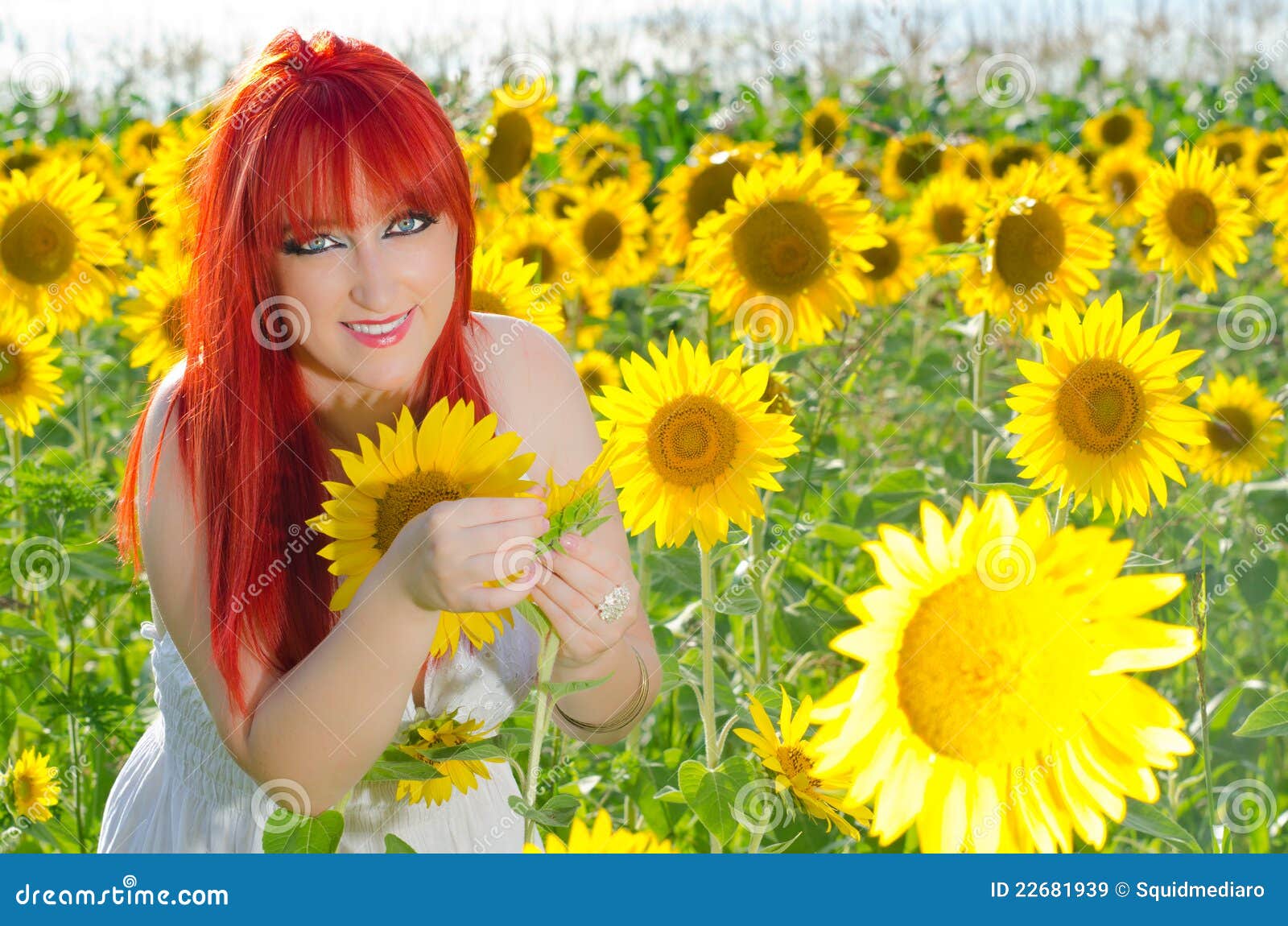 Loving the nature stock image. Image of sunflower, person - 22681939