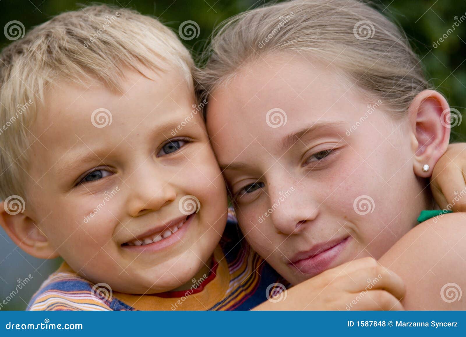 Loving siblings stock photo. Image of dimple, grinning - 1587848