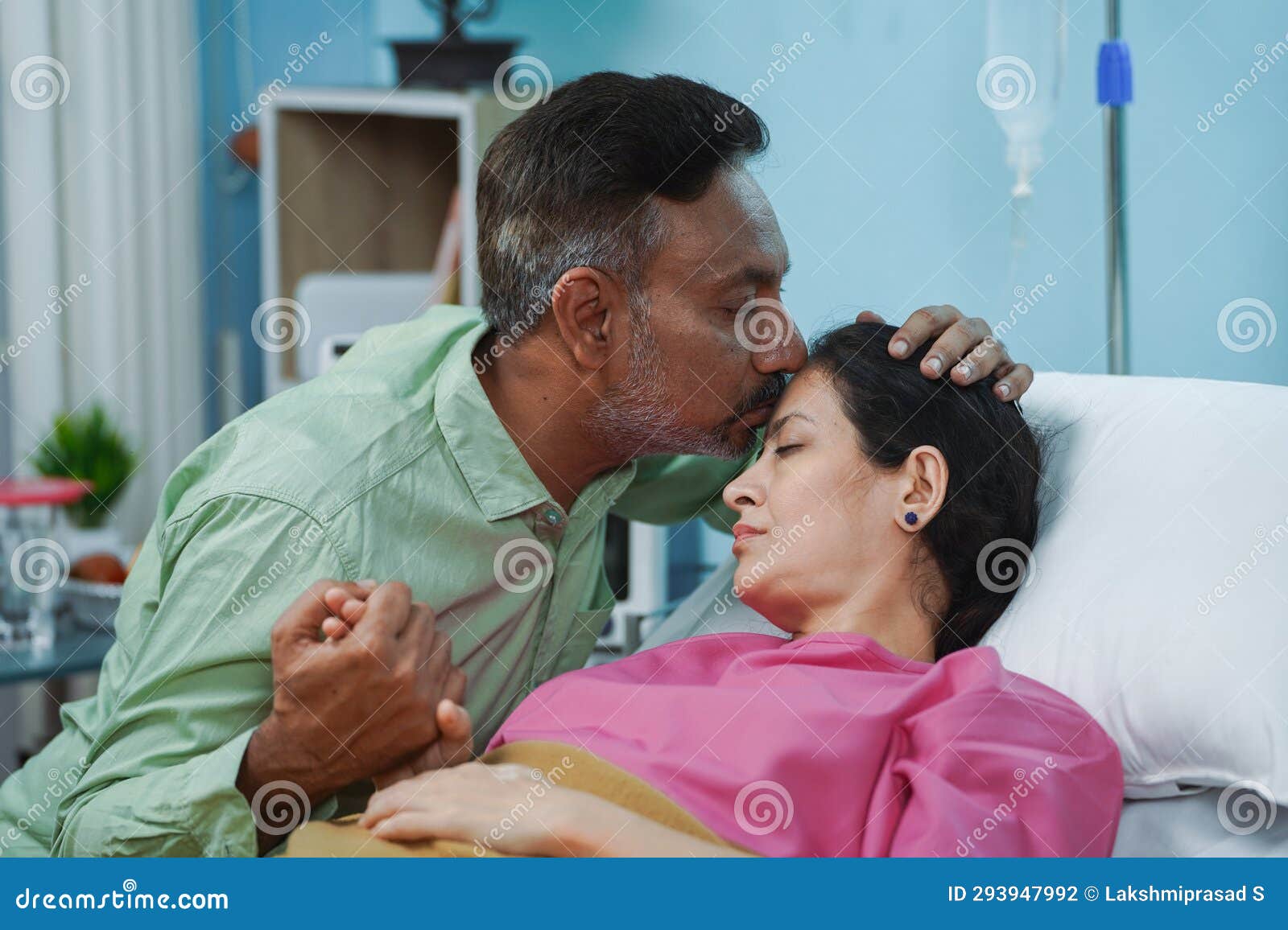 Loving Supportive Husband Comforts His Wife During Her Hospital Stay By