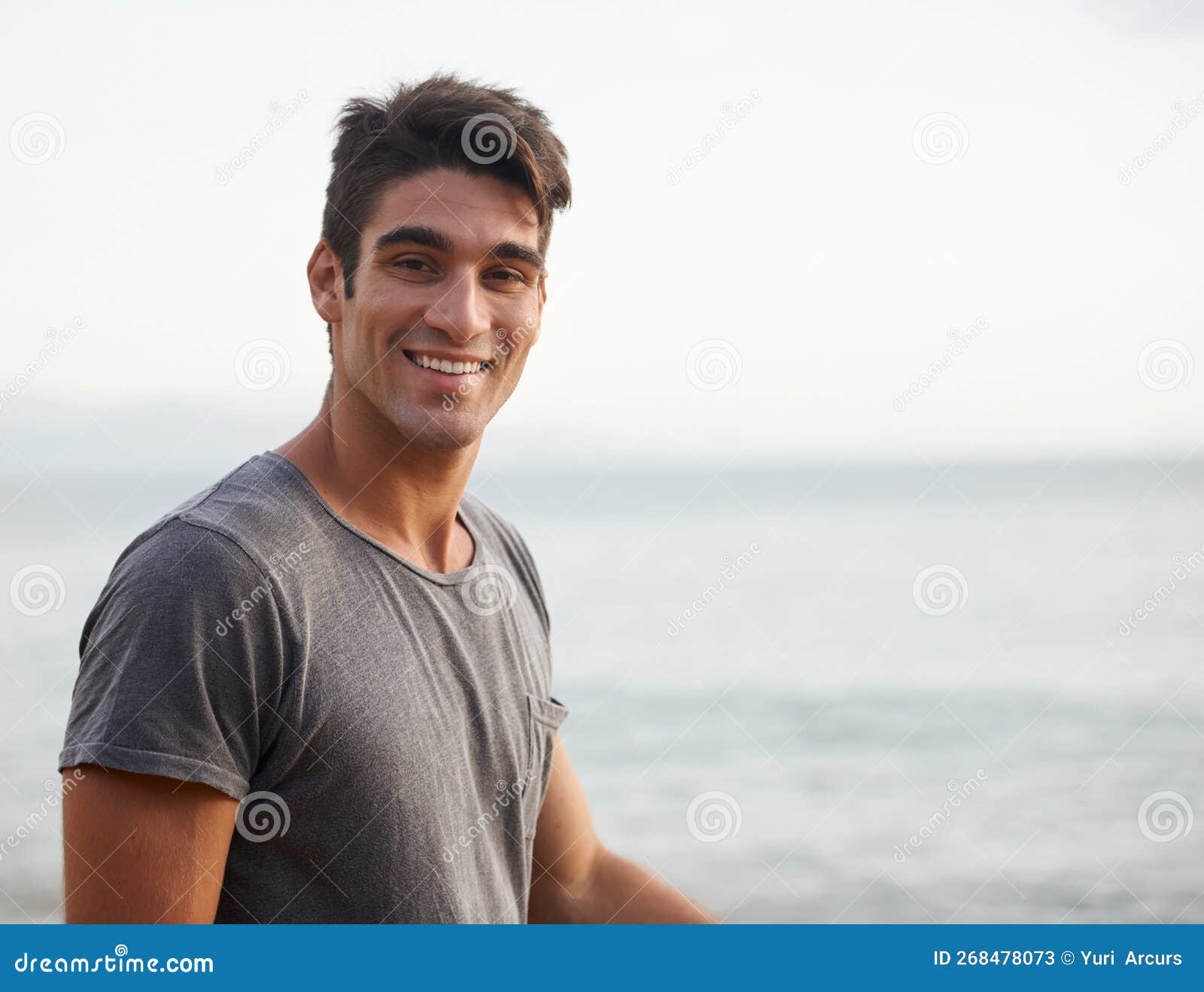 Loving the View. a Handsome Young Man on the Beach. Stock Image - Image ...