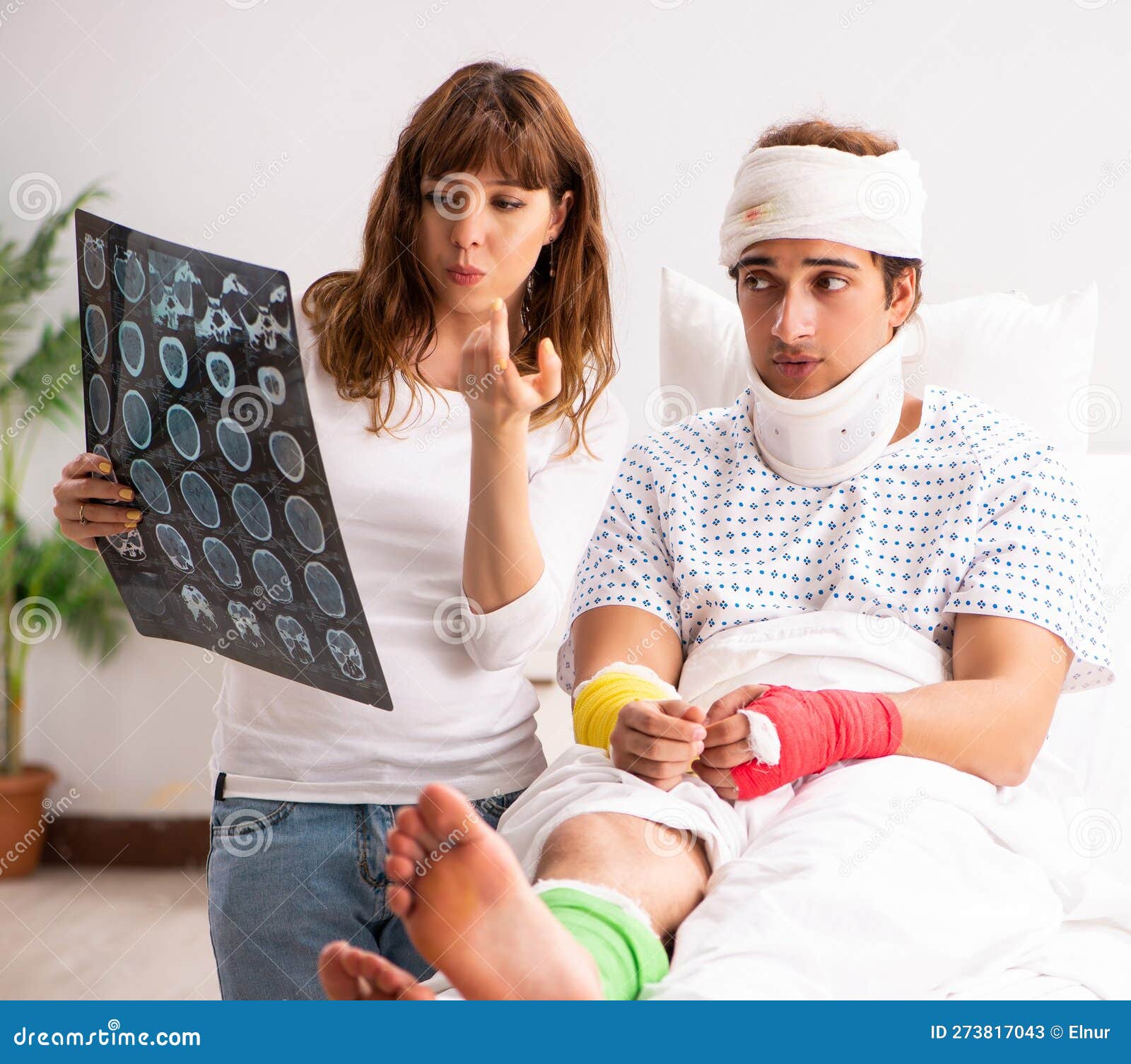 Loving Wife Looking after Injured Husband Stock Image - Image of ...