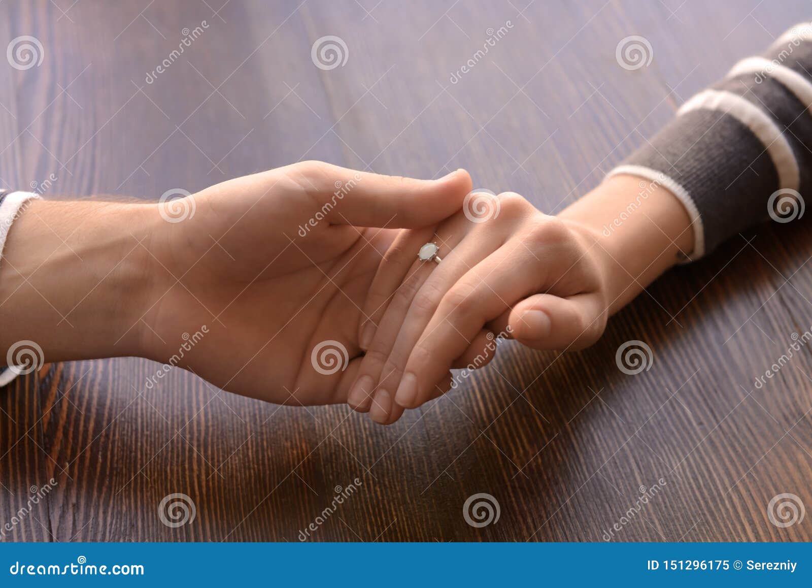 Loving Young Couple Holding Hands at Table, Closeup Stock Image - Image ...