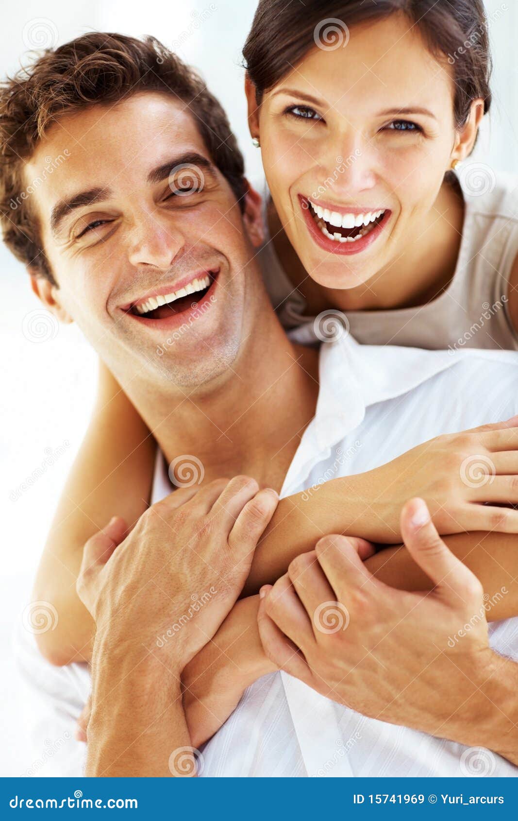Loving Young Couple Together with Arms Around Stock Image - Image of ...