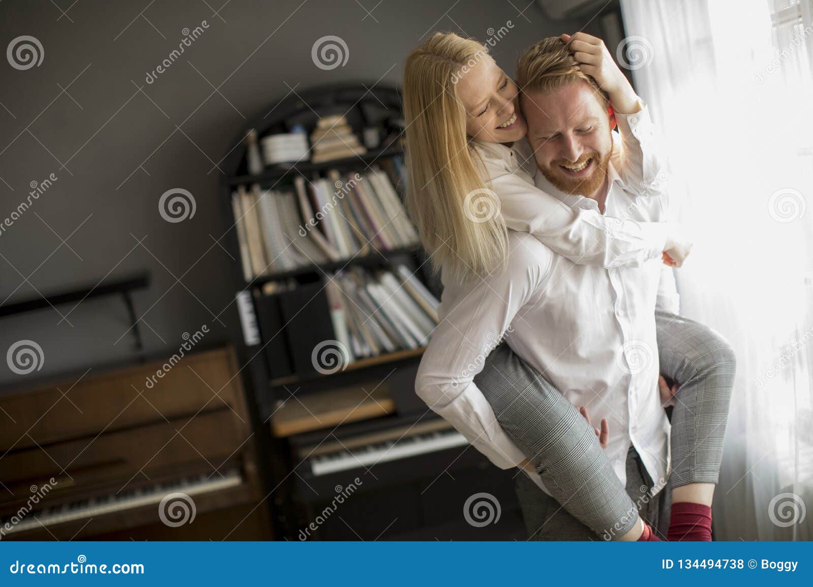 Loving Young Having Fun in the Room Stock Photo - Image of domestic ...