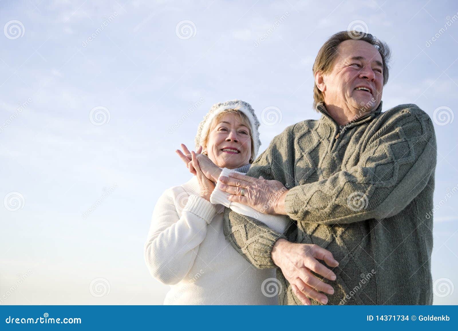 Low Angle of Affectionate Mature Couple Arm in Arm Stock Photo - Image ...