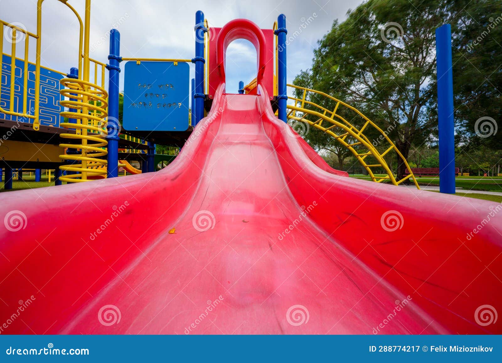 Low Angle Bottom of a Park Slide Red Stock Image - Image of bottom ...