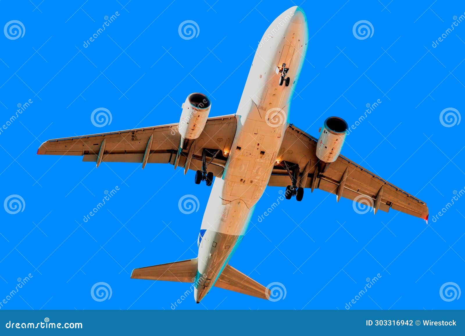 Low Angle of the Bottom View of the Landing Plane in Blue Sky Stock ...