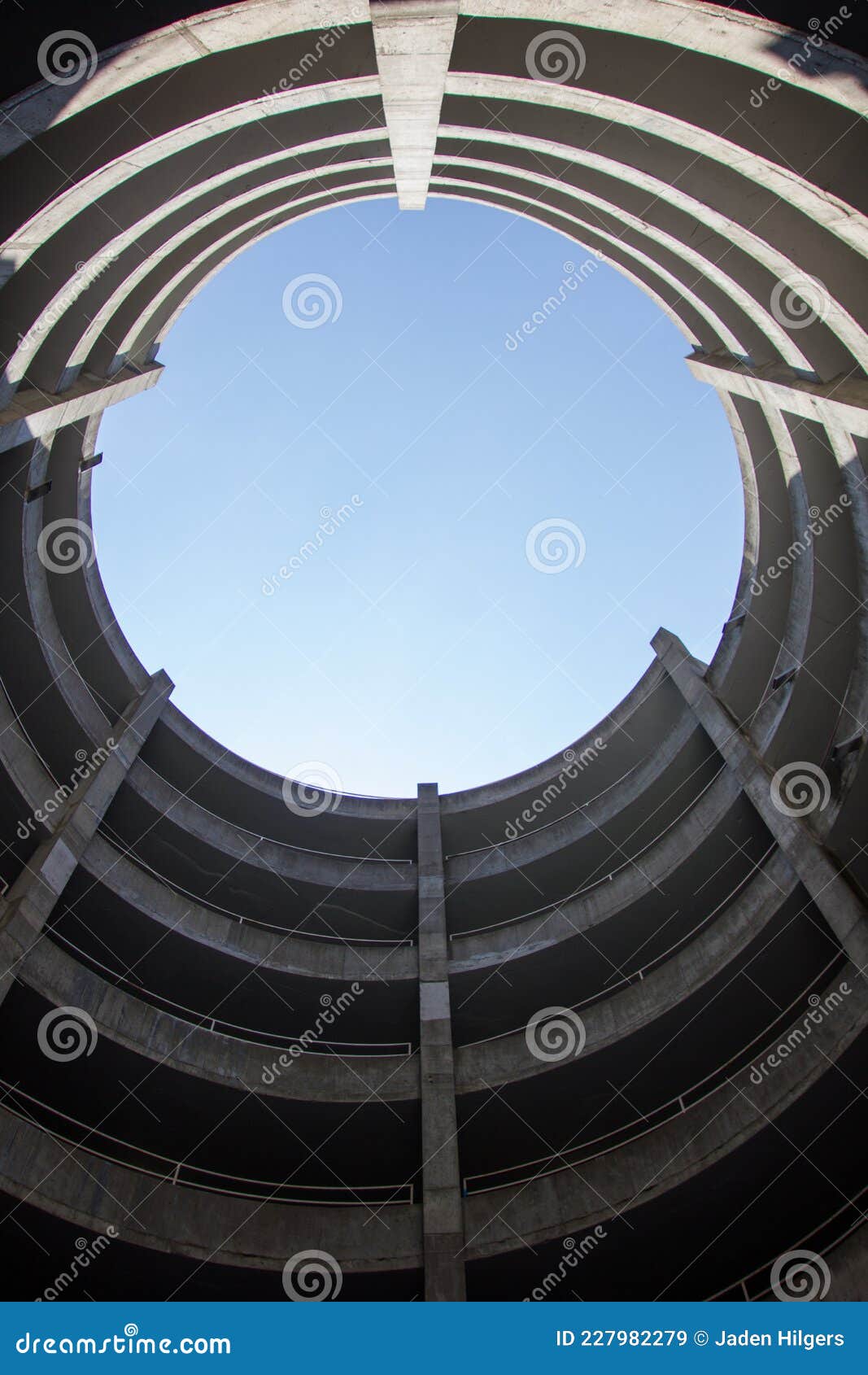 Low Angle of Circular Parking Garage Stock Image - Image of light, arch ...