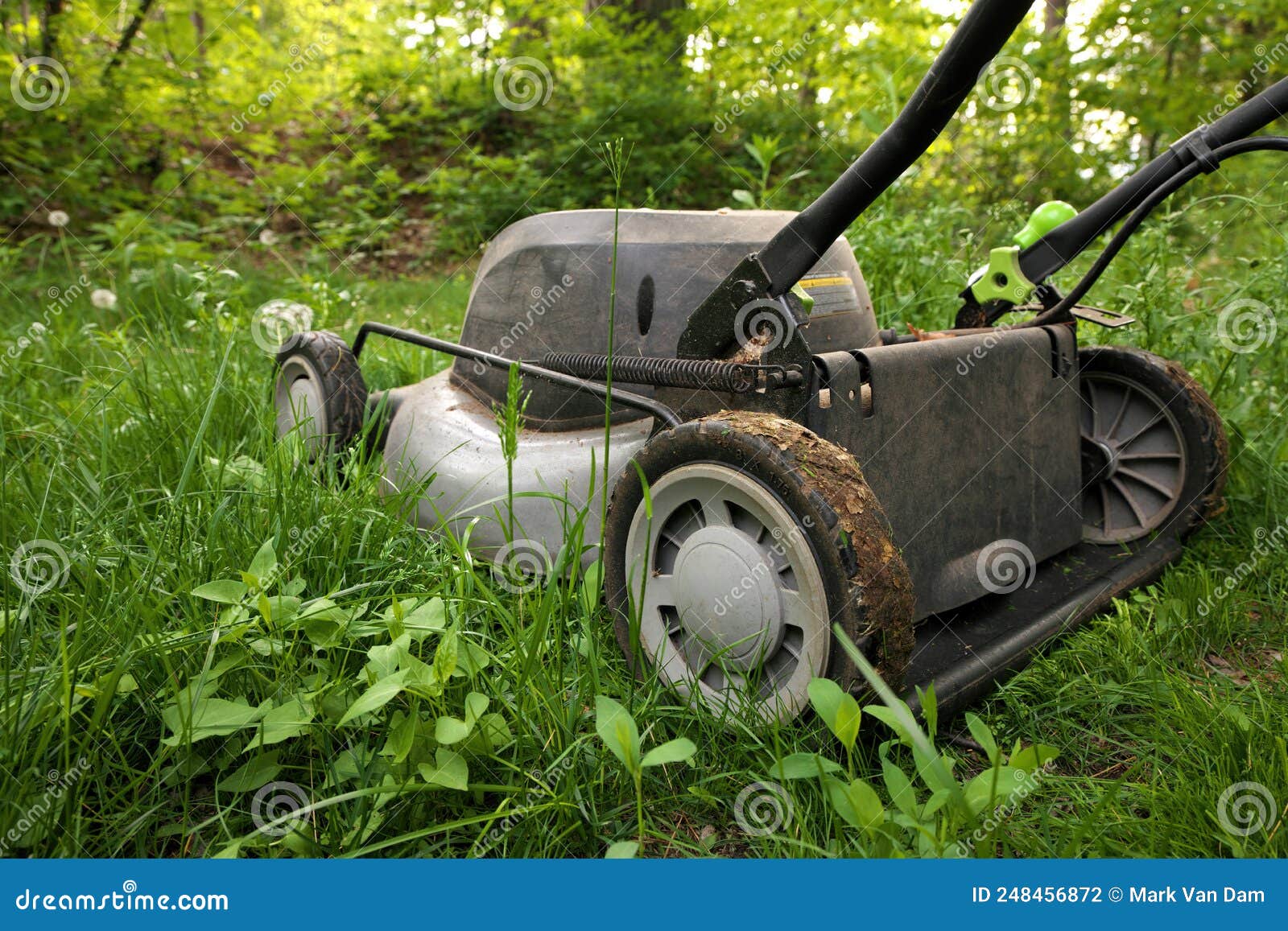 Low Angle Close Up Lawnmower Ready To Be Cutting Long Grass or ...