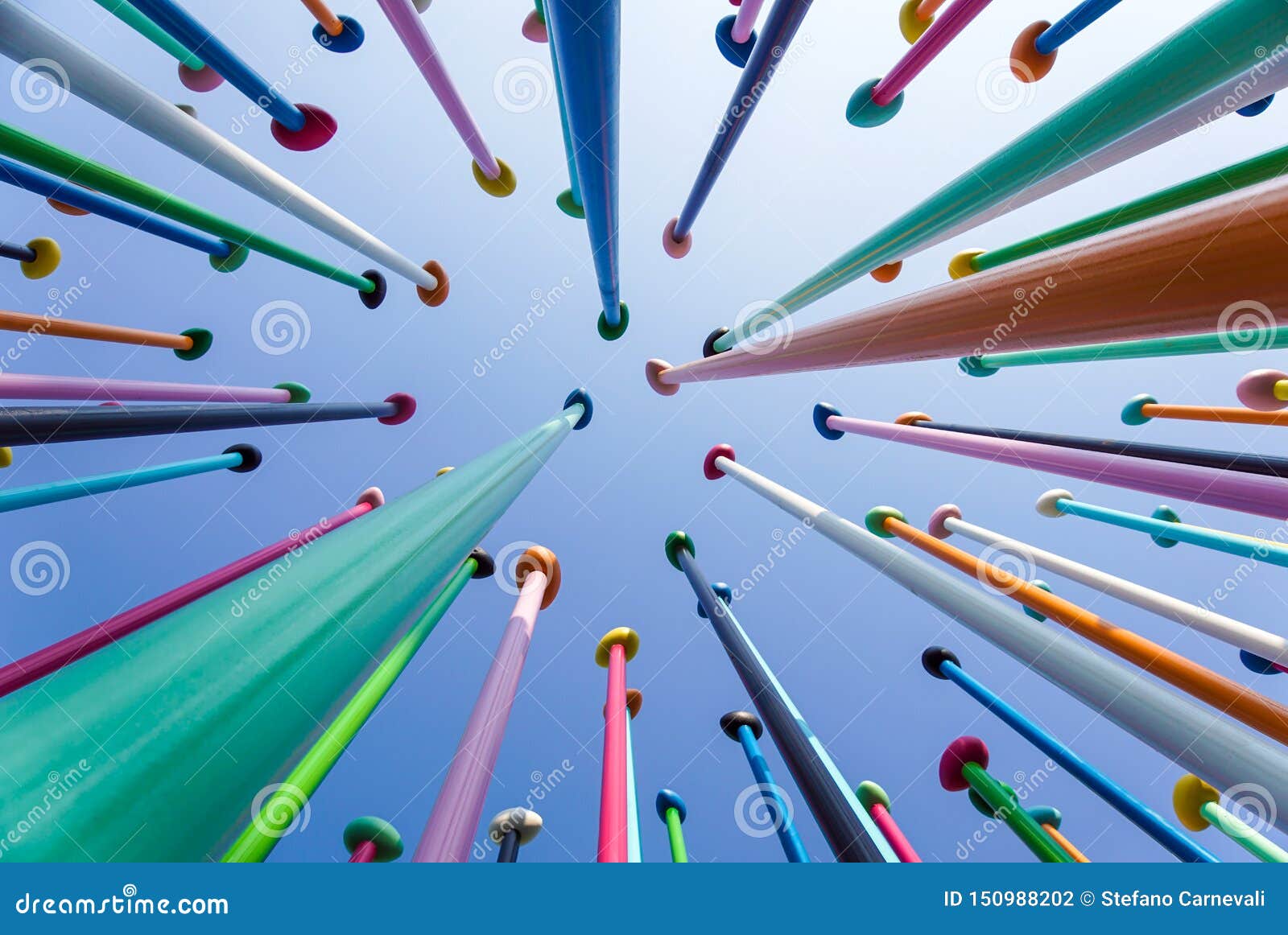 MILAN, ITALY 4 MAY 2019.: Low Angle of Colorful Thin Poles Against Blue ...