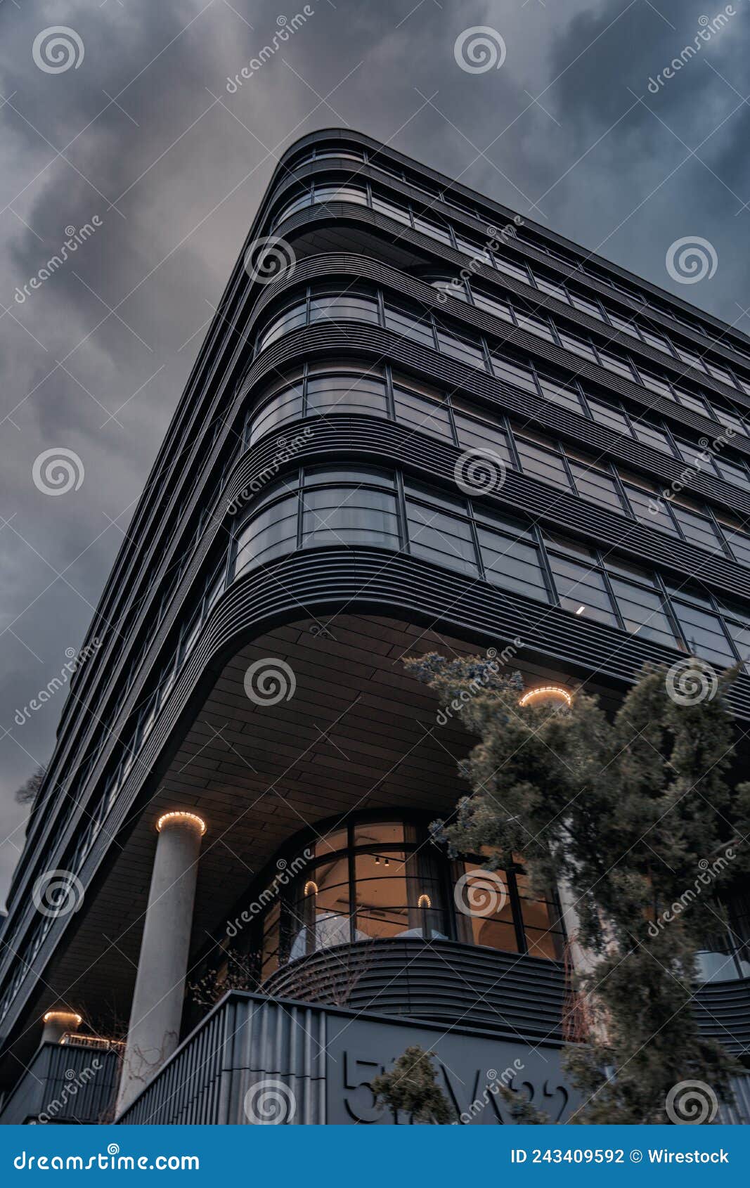 Low Angle of a Corner of a Building with Cloudy Sky Background Stock ...