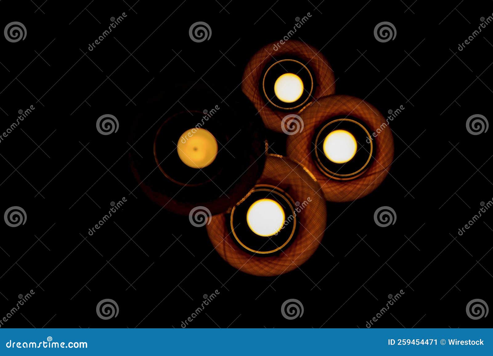 Low Angle of Four Lamps with a Dark Background. Stock Image - Image of ...