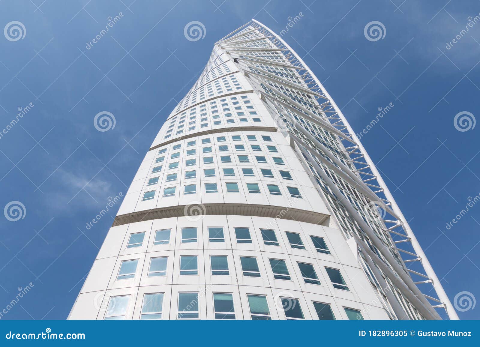 Low Angle Image of Turning Tower Building in Malmo, Sweden with Blue ...