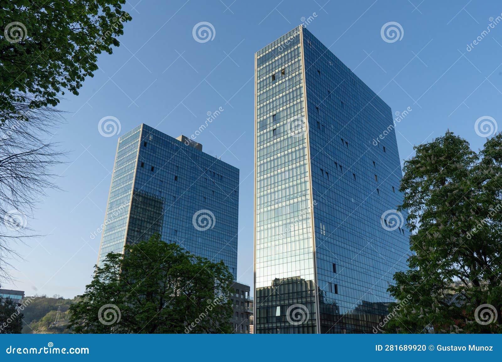 Low Angle Image of Two Twin Rectangular Buildings with Glass Enclosures ...