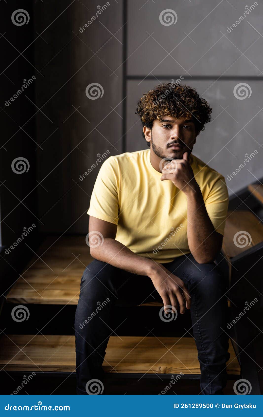 Low Angle Indian Man Sitting on Steps at Home Stock Photo - Image of ...