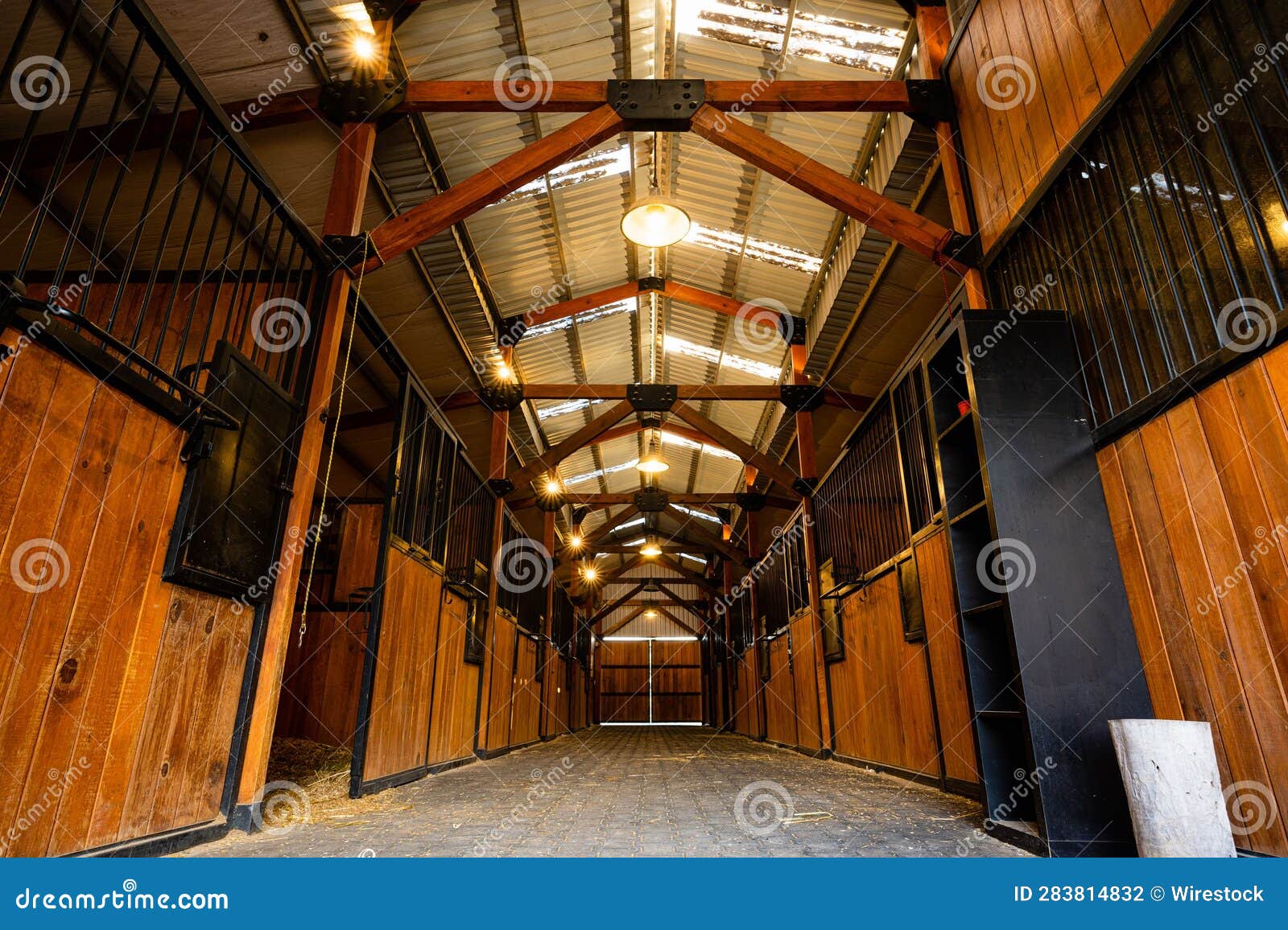 Low-angle of the Interior of Rustic Wooden Horse Stables Stock Photo ...