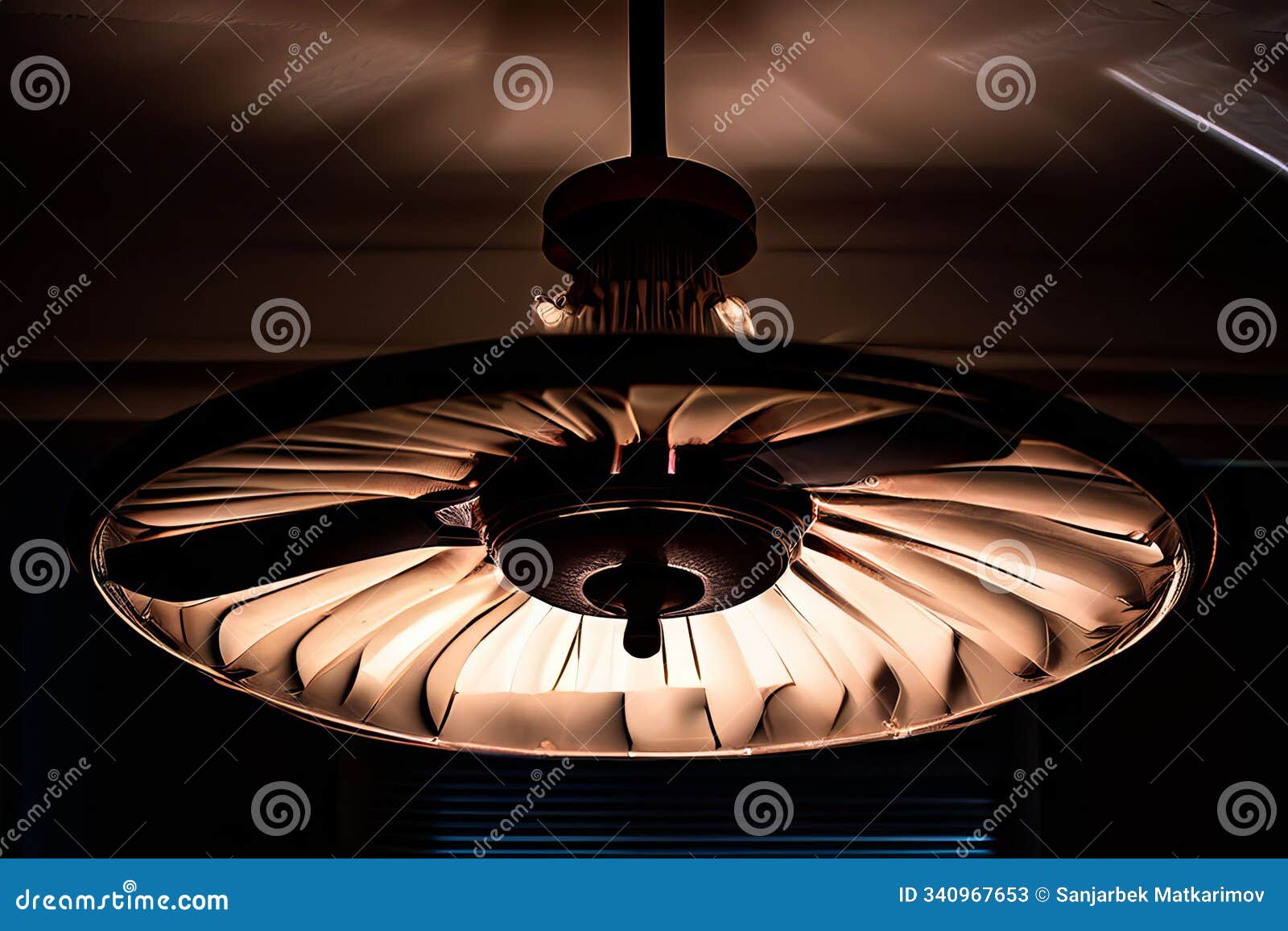 Low Angle Looking Up at a Ceiling Fan Slowly Rotating Creating a Stock ...